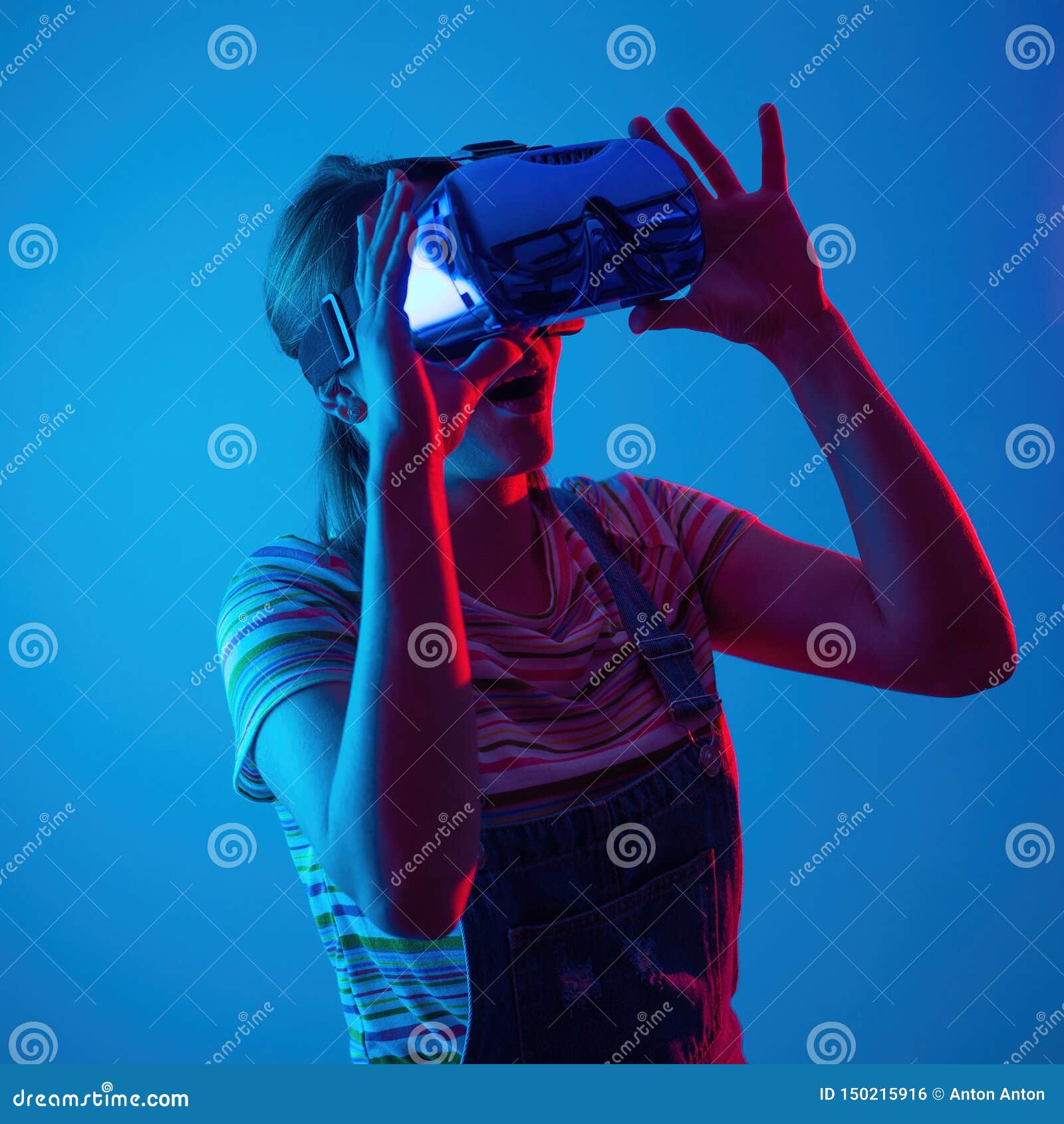 Young Cute Girl Playing Vr. with Creative Blue-red Light Stock Photo ...