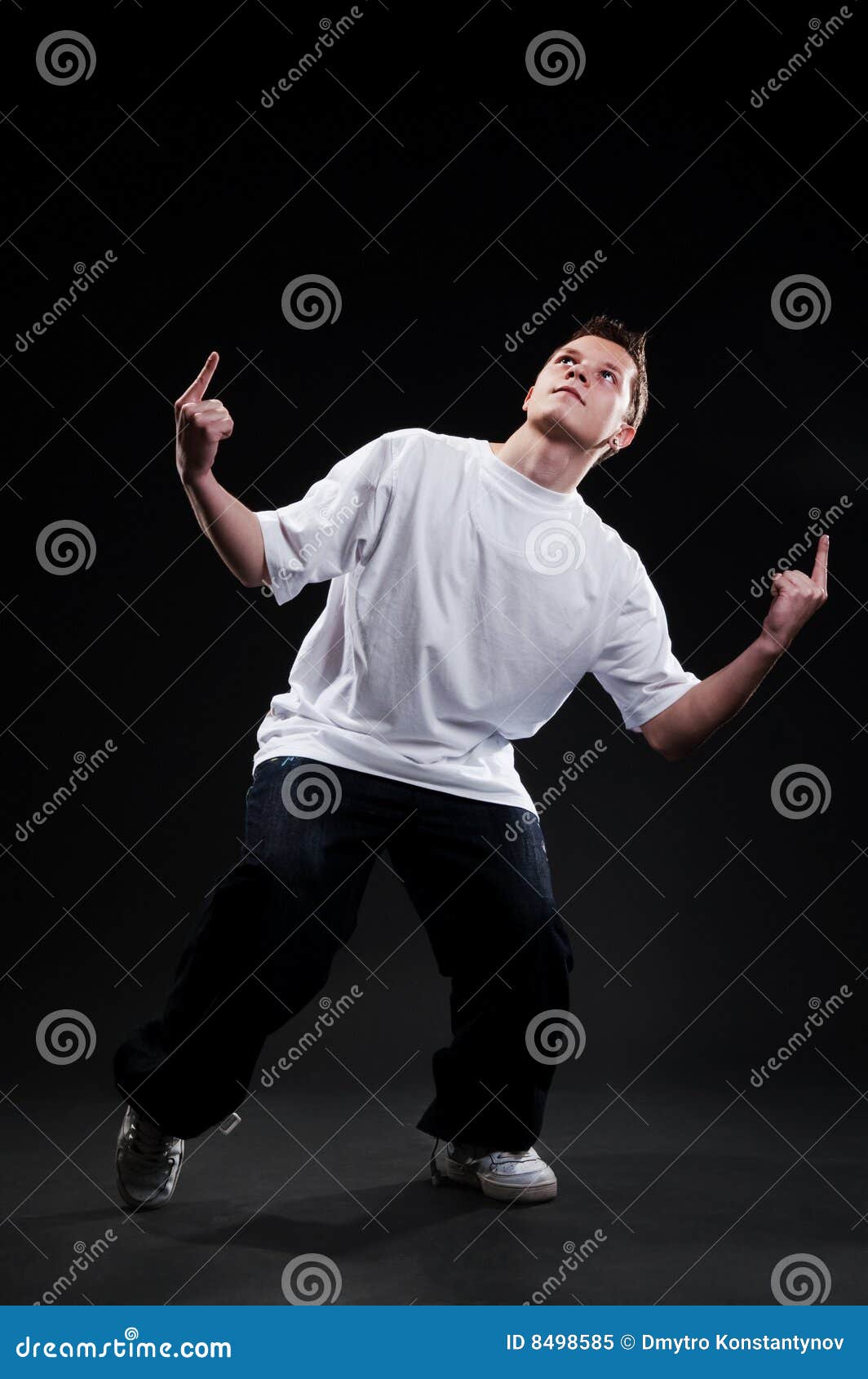 Young dancer pointing up stock image. Image of posing - 8498585