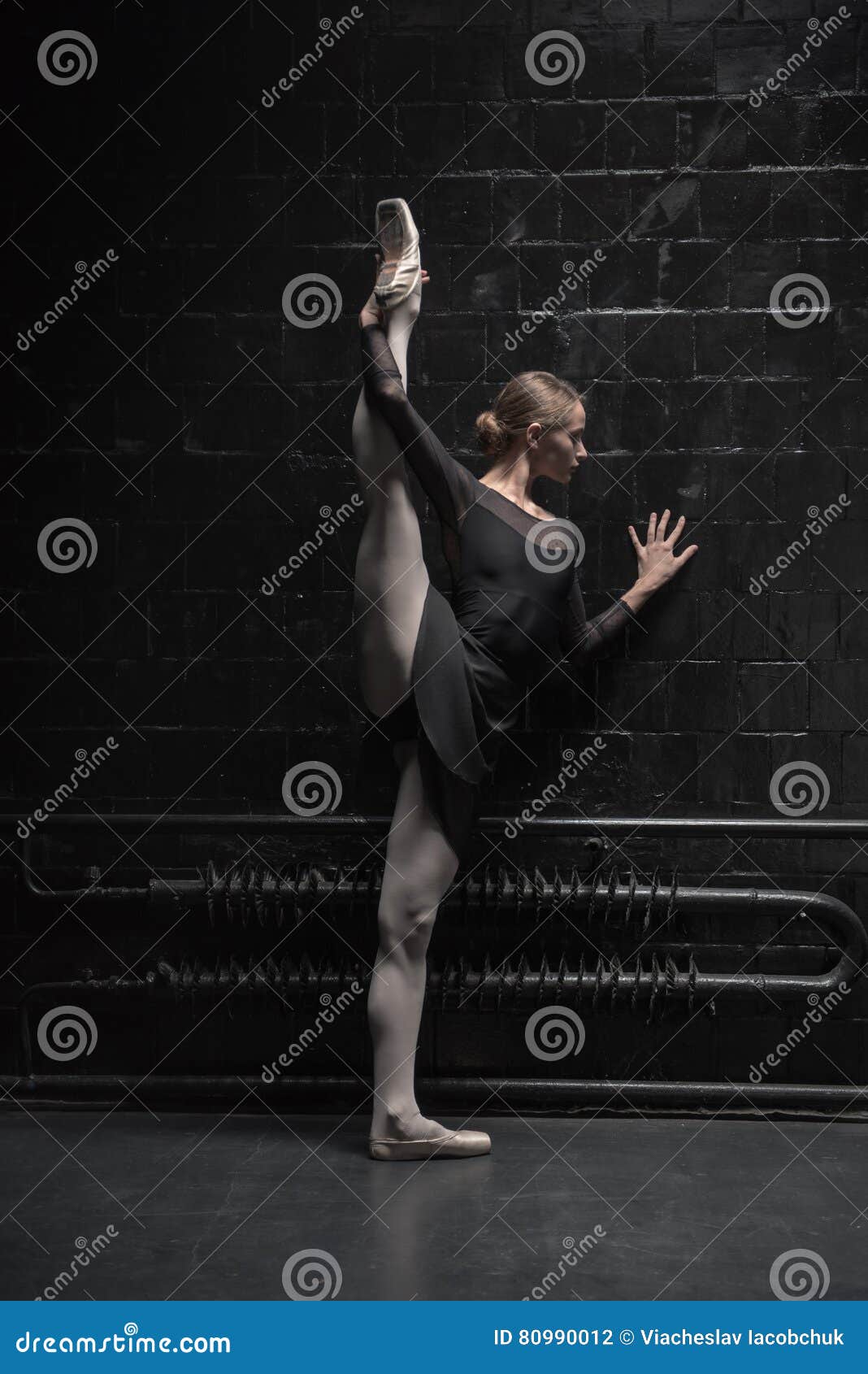 Young Dancer Training Near the Black Wall Stock Photo - Image of ...