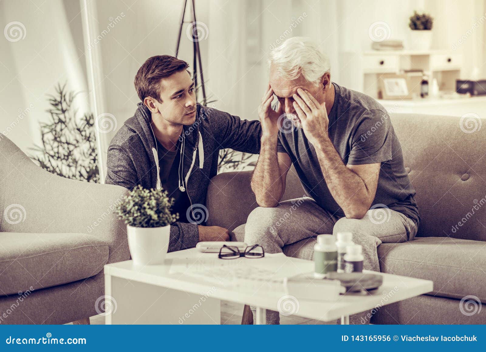 Young Dark-haired Pleasant Son Calming Down Aging Silver-haired ...