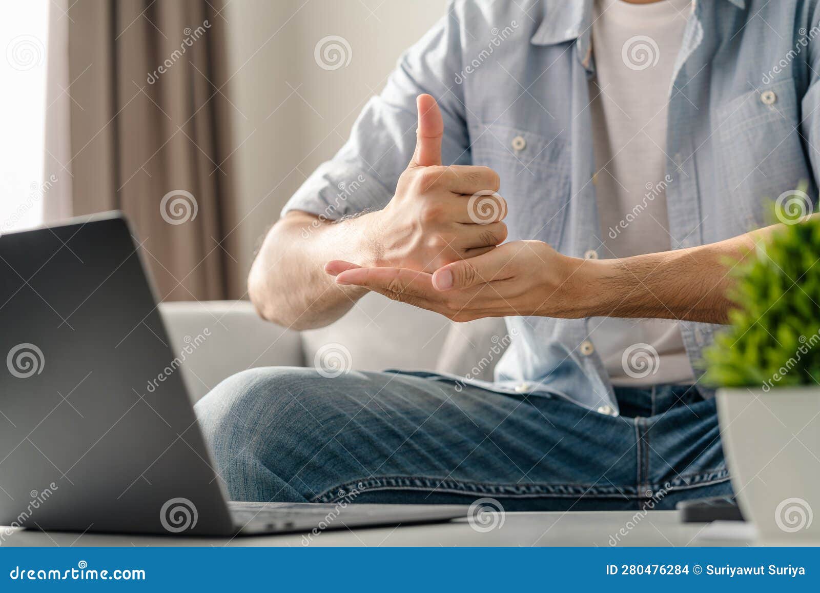 Young Deaf Man Using Laptop Computer for Online Video Conference Call ...