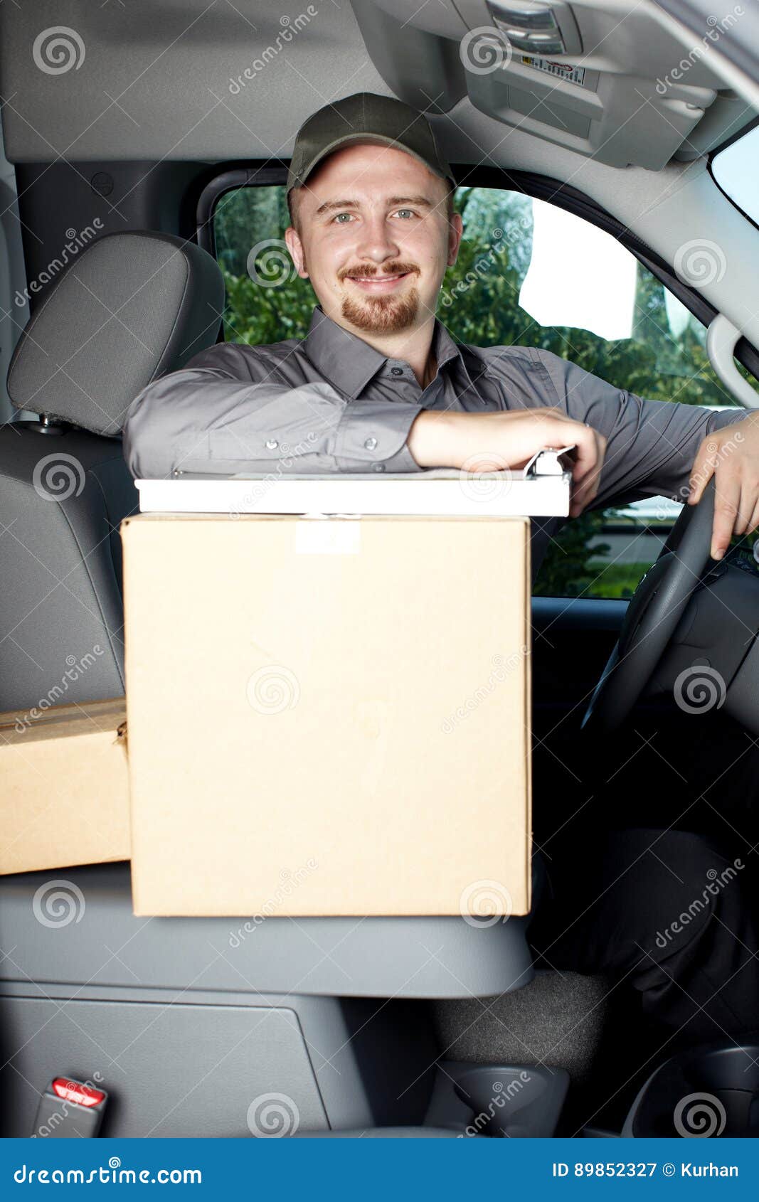 Young Delivery Man in the Car. Stock Image - Image of male, load: 89852327