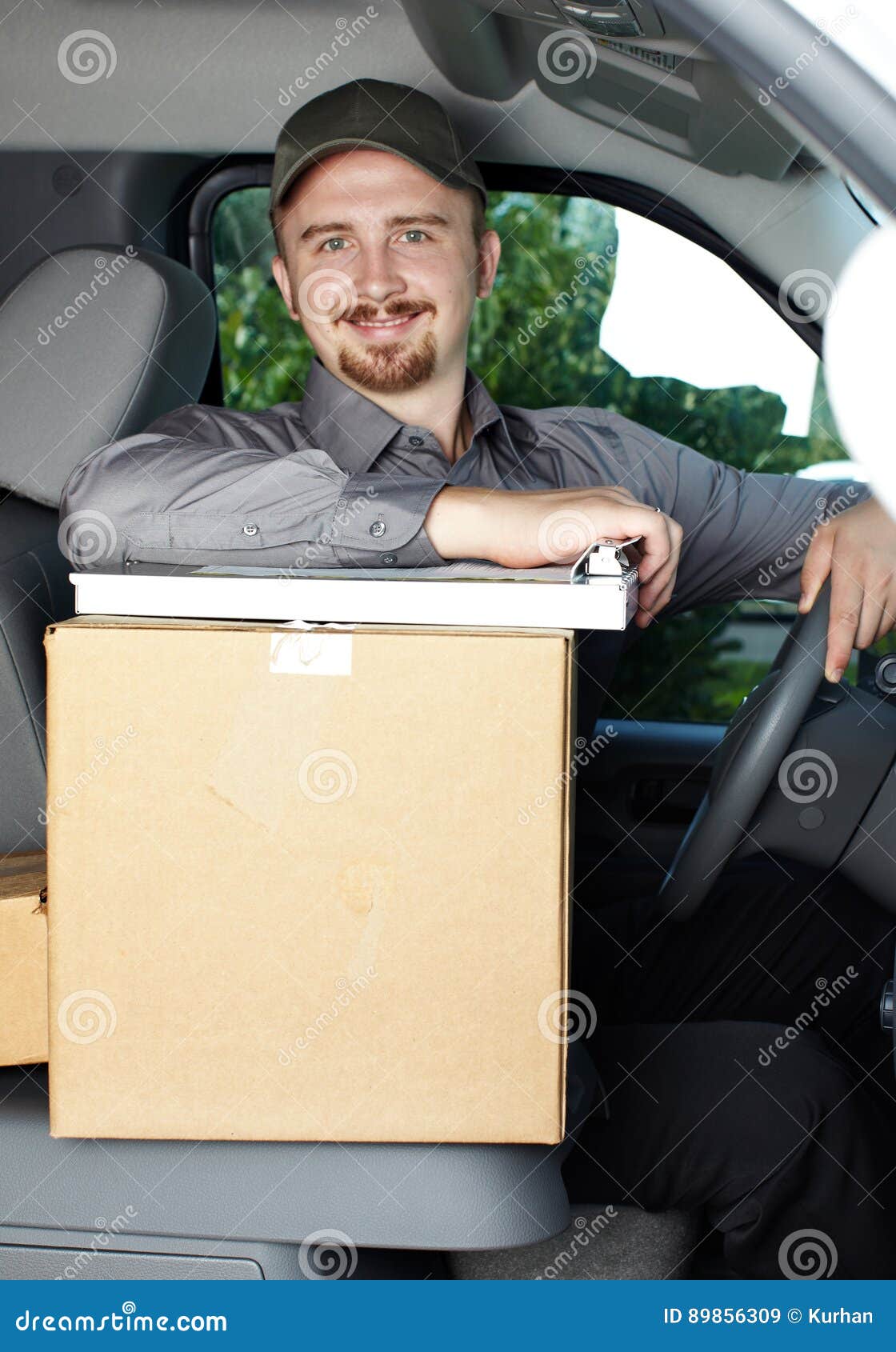 Young Delivery Man in the Car. Stock Image - Image of goods, driver ...