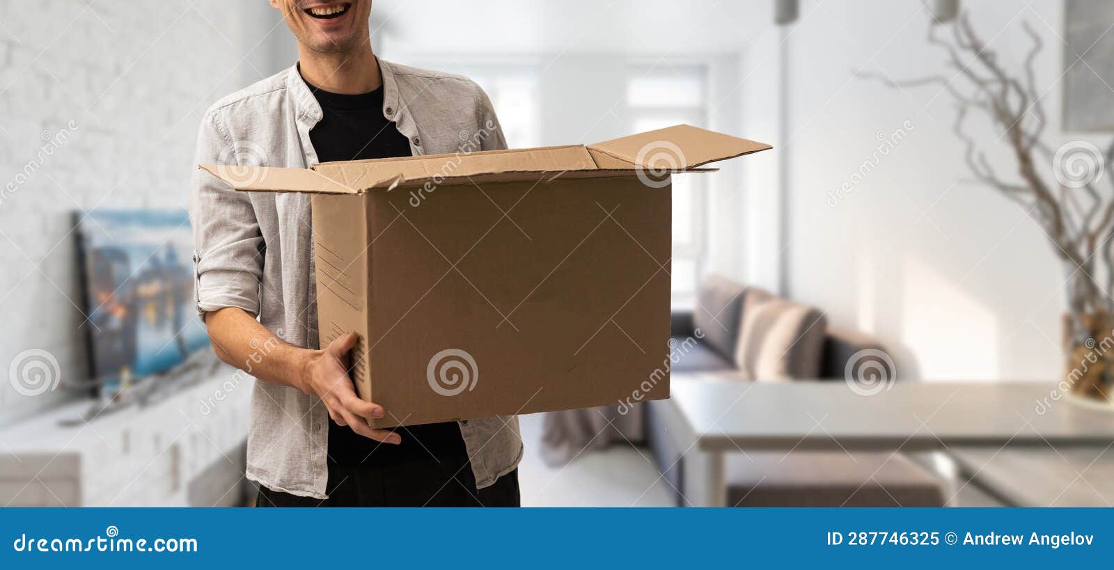 Young Delivery Man Standing with Parcel Post Box Stock Image - Image of ...