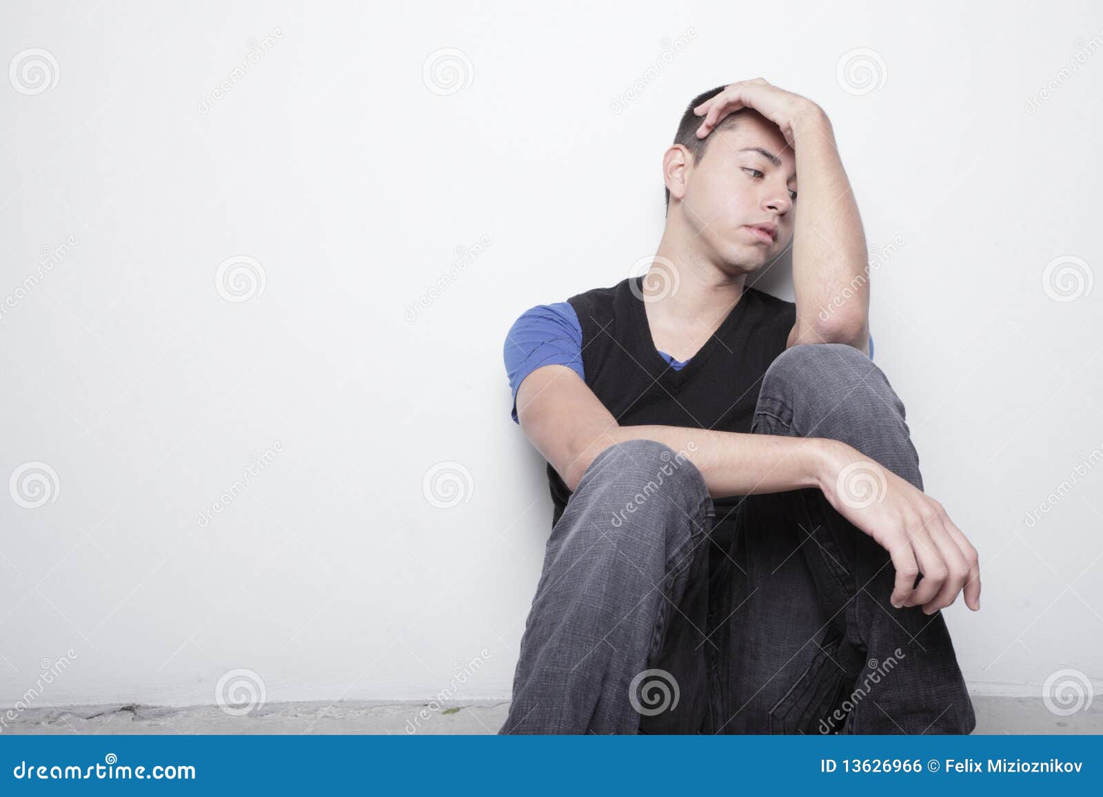 Young Depressed Man Sitting Stock Photo - Image of issue, white: 13626966
