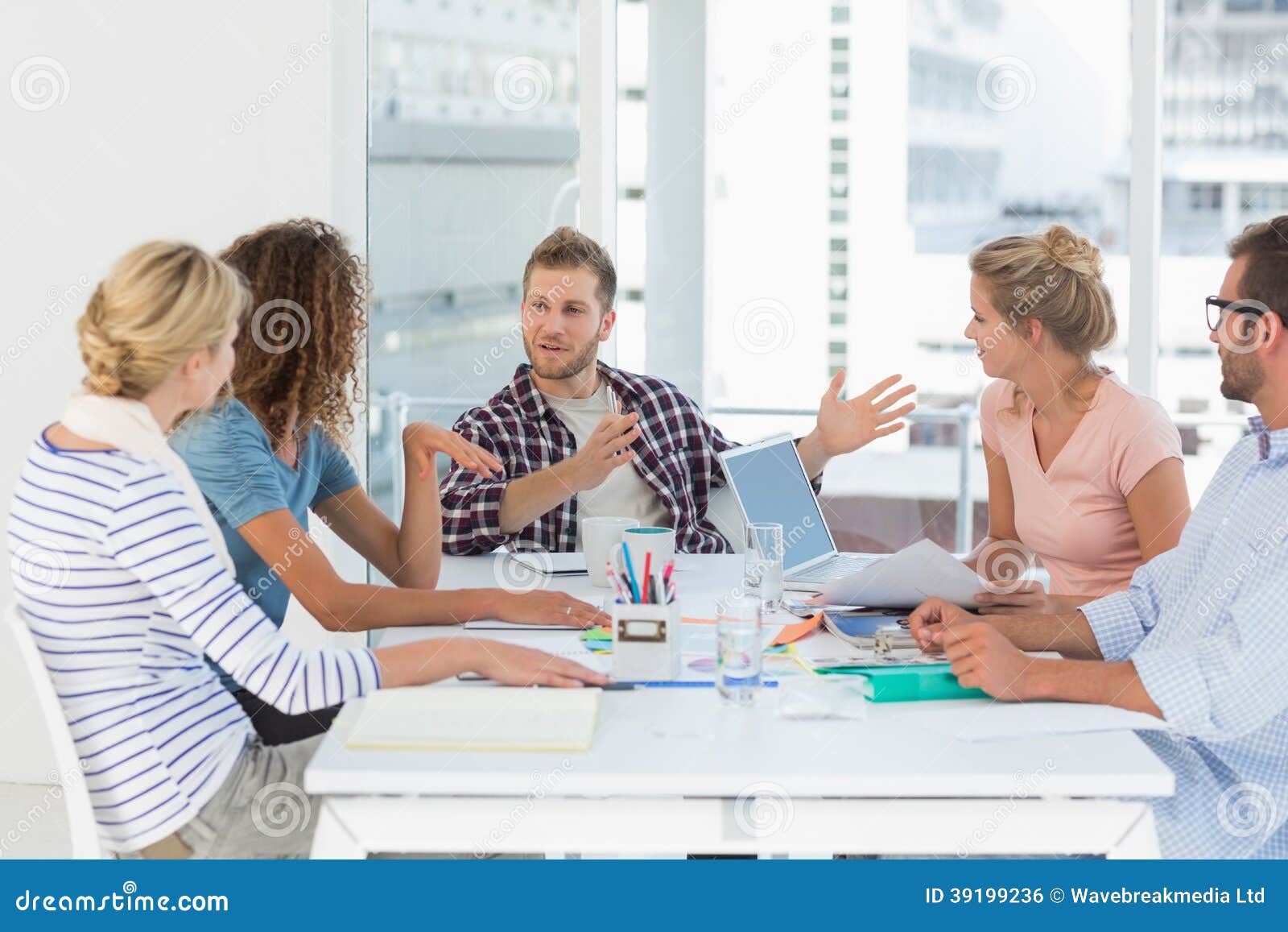 Young Design Team Having a Meeting Together Stock Photo - Image of five ...