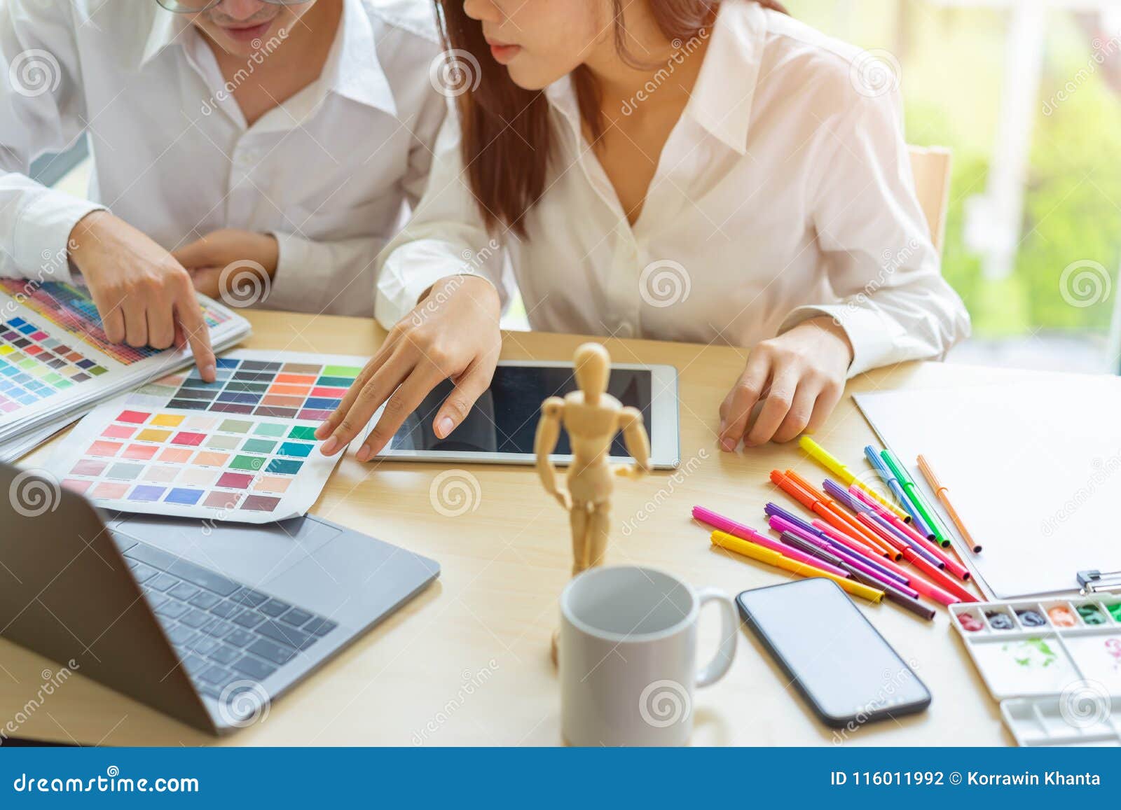 Young Designers Teamwork Working with Color Samples for Selection on ...