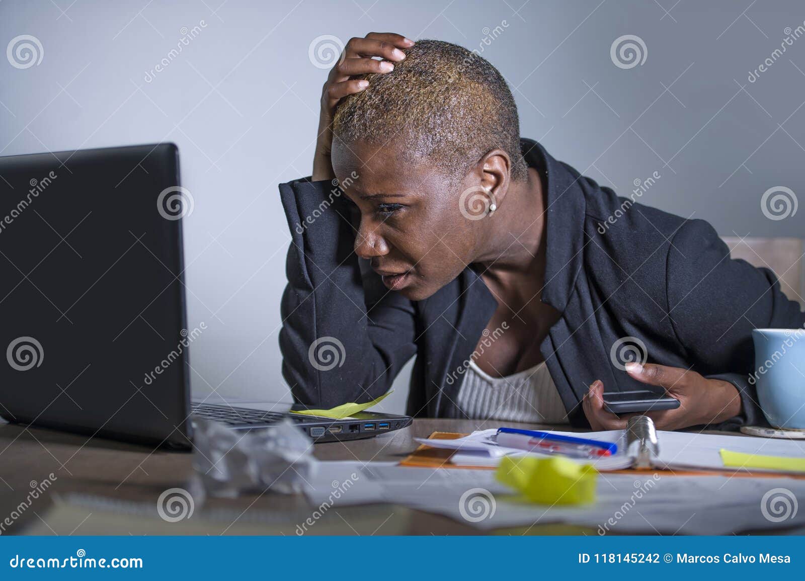 Young Desperate And Stressed African American Business Woman Working At