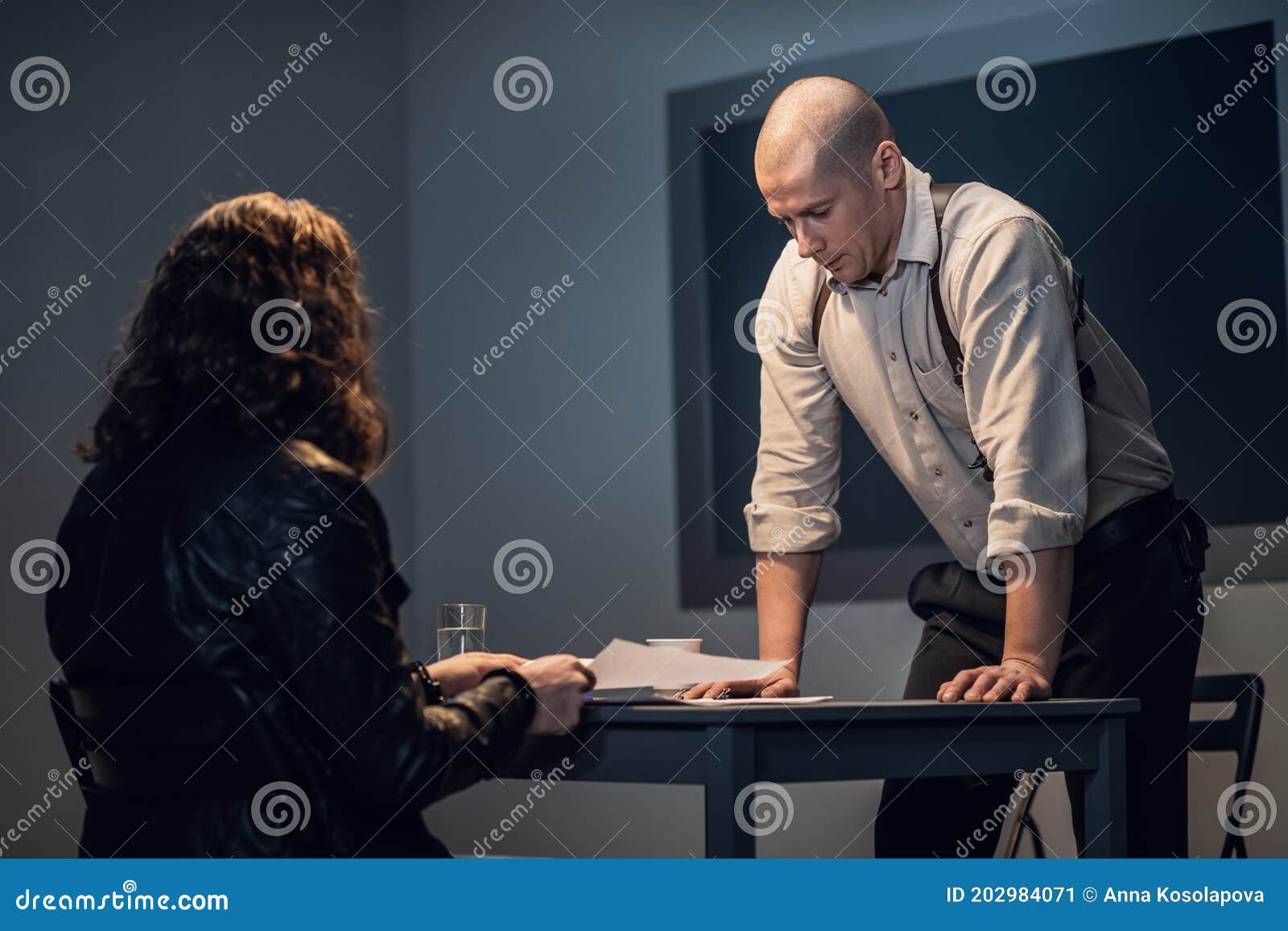 A Young Detective Interviews a Suspect in a Crime Stock Image - Image ...