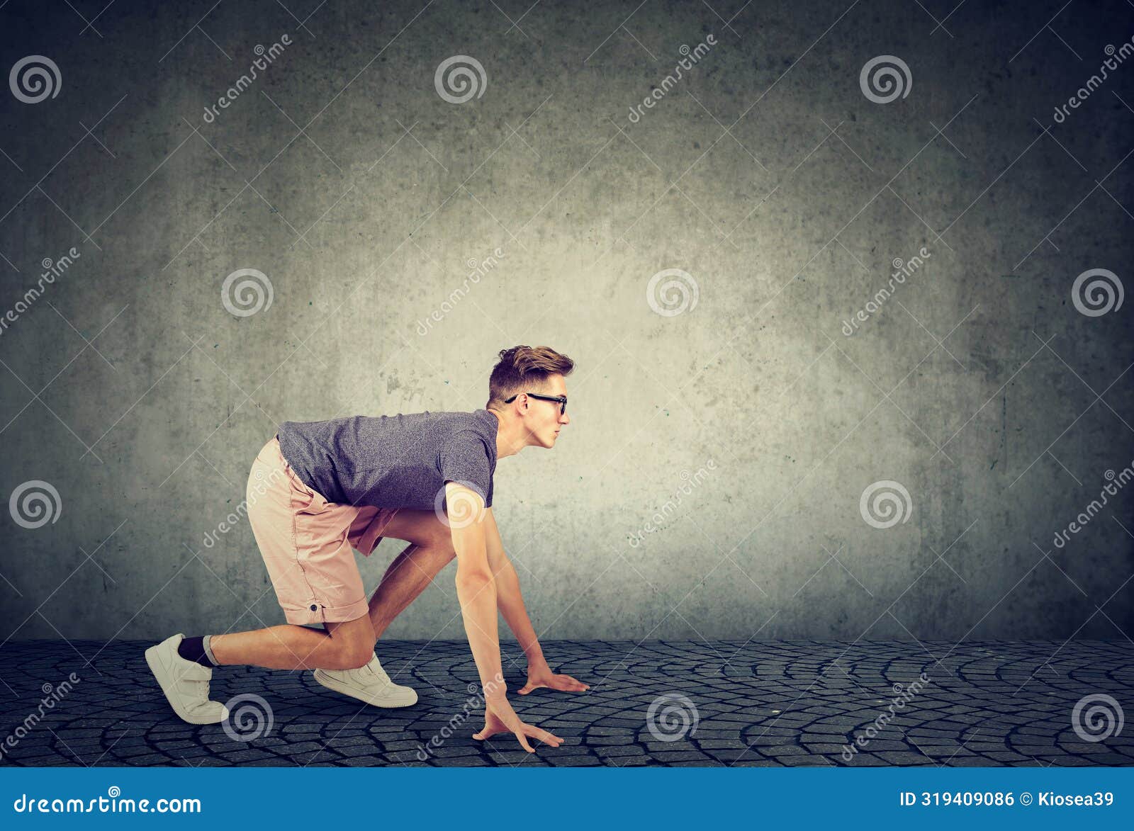 Young Determined Man a Student Ready in a Start Position Stock Photo ...