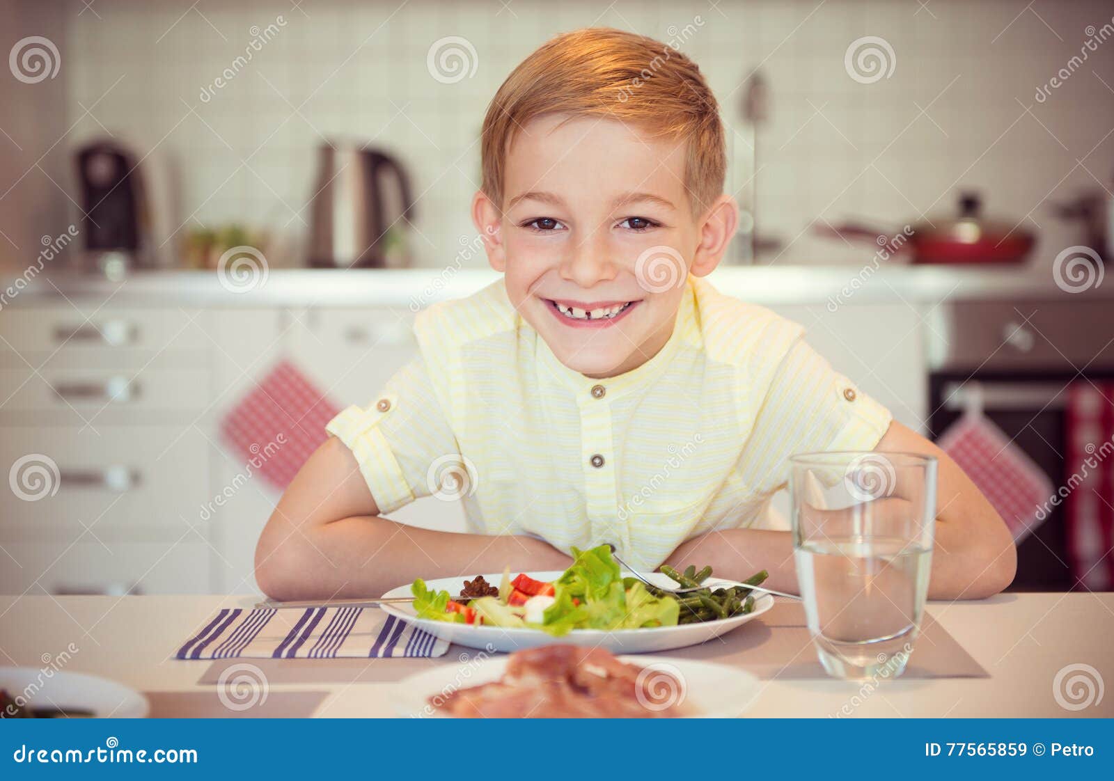Young Diligent Happy Boy at a Table Eating Healthy Meal with Cu Stock ...