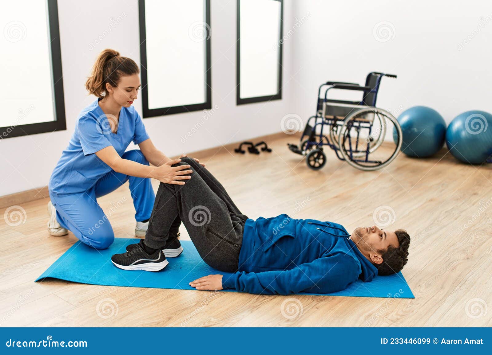 Young Disabled Man Making Mobility Exercise at the Clinic Stock Image ...