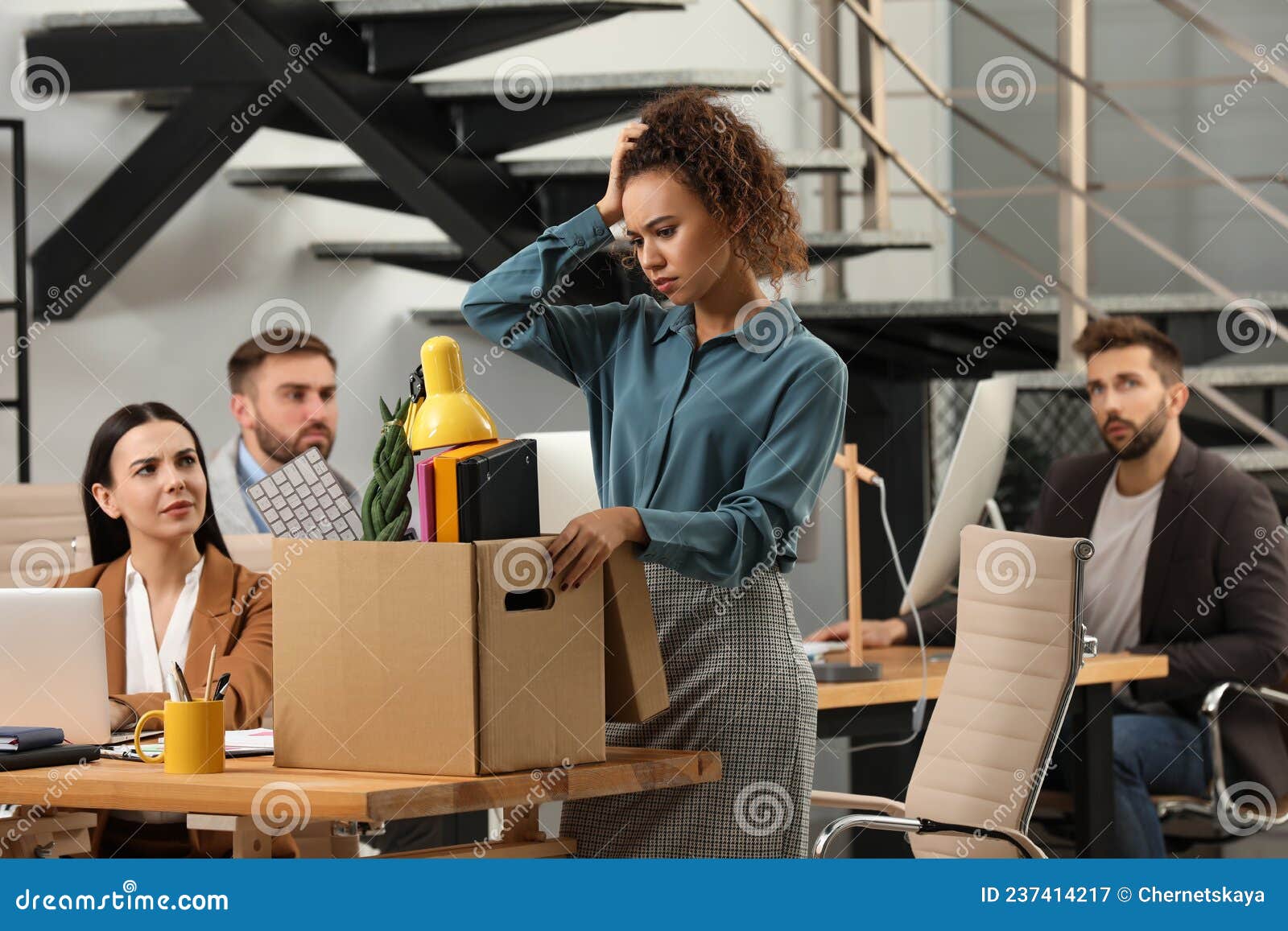 Young Dismissed Woman Packing Stuff into Box at Office Stock Image ...