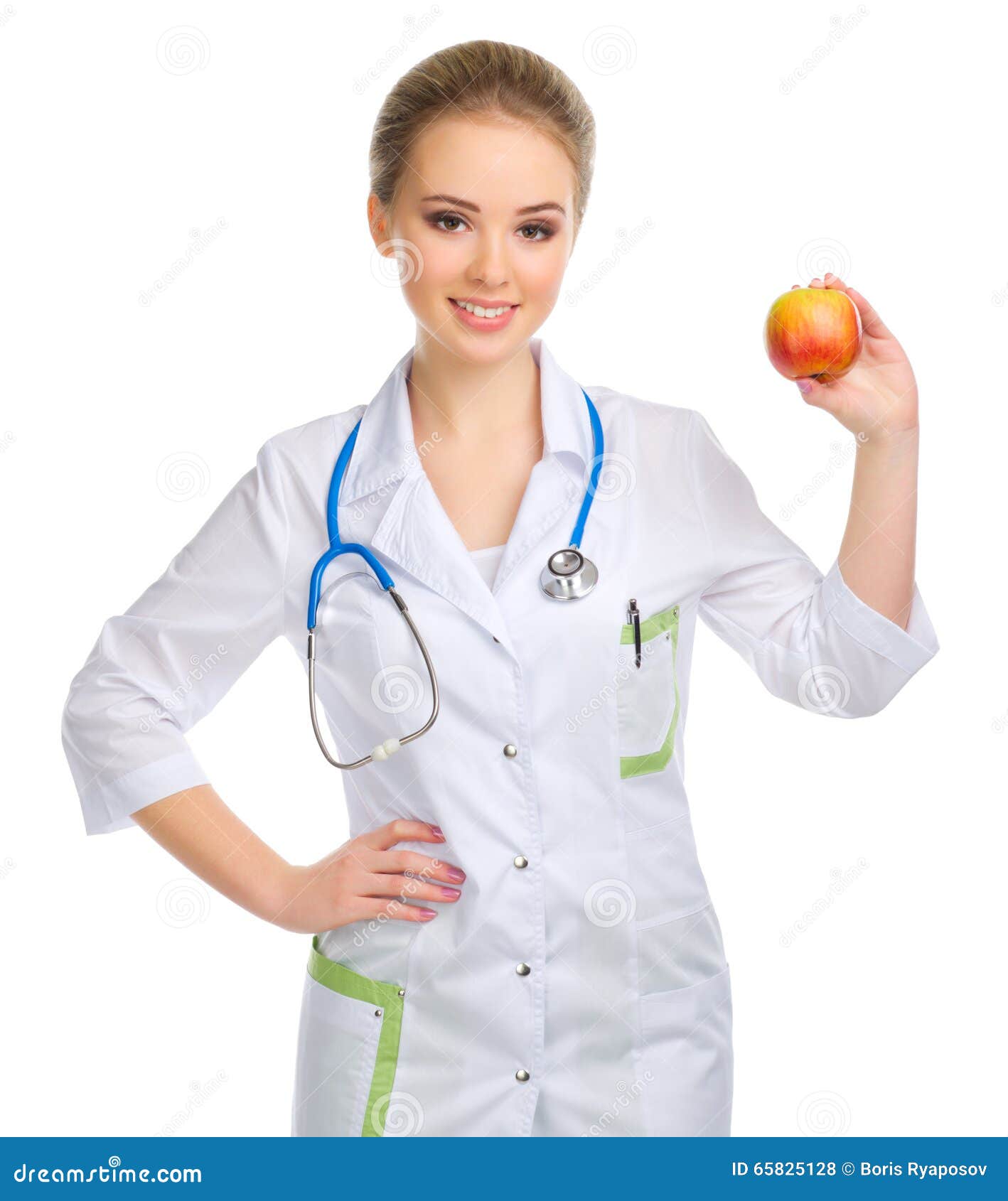 Young doctor with apple stock photo. Image of care, attractive - 65825128