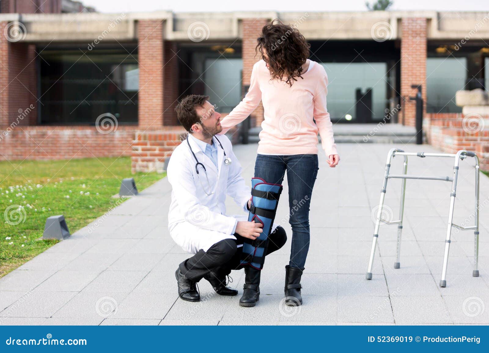 Young Doctor Assisting a Young Woman Stock Image - Image of accident ...