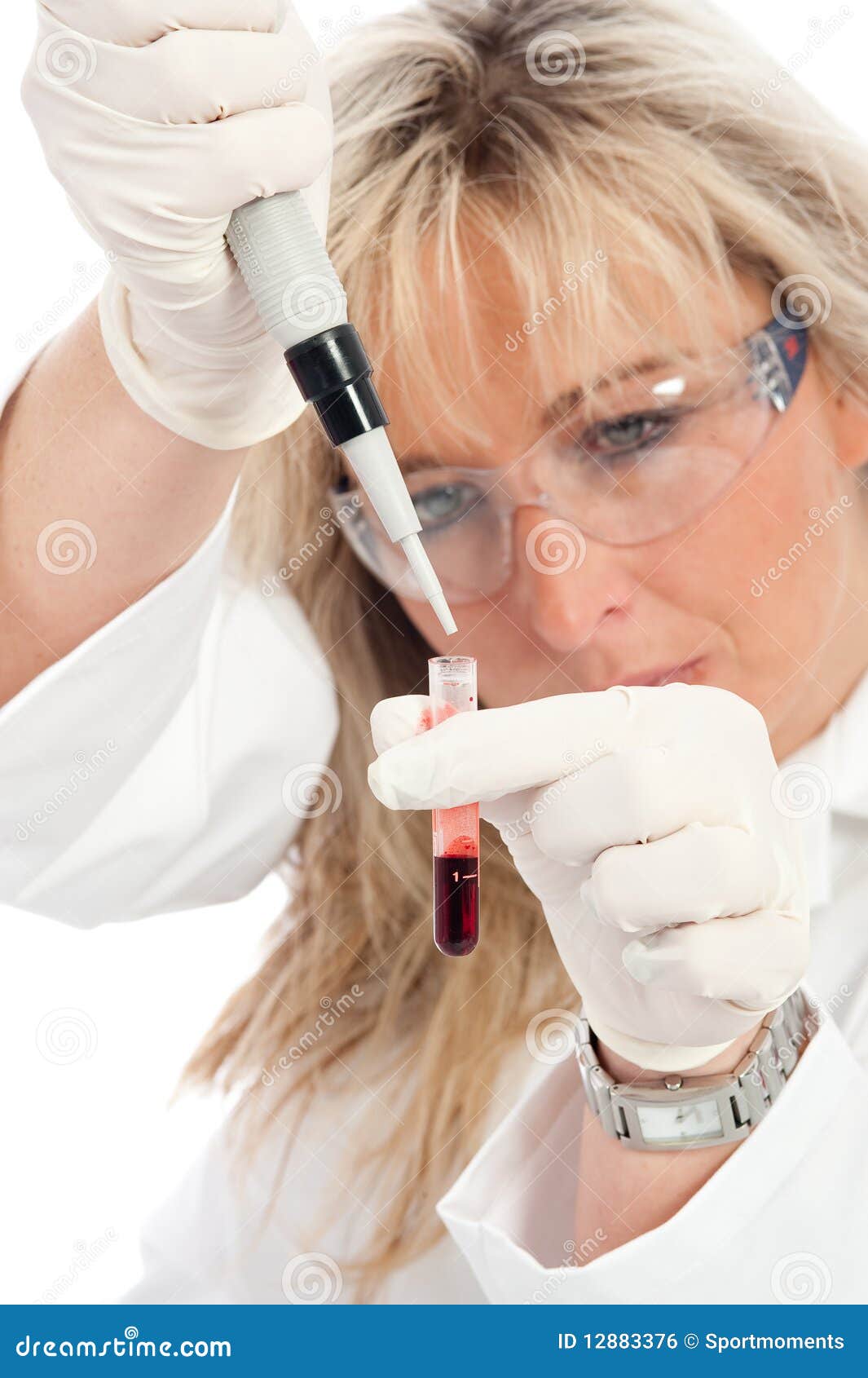 Young Doctor with a Blood Sample Stock Photo - Image of test, gloves ...