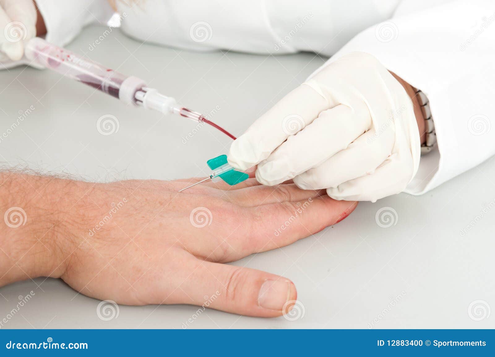 Young Doctor with a Blood Sample Stock Photo - Image of feminine ...