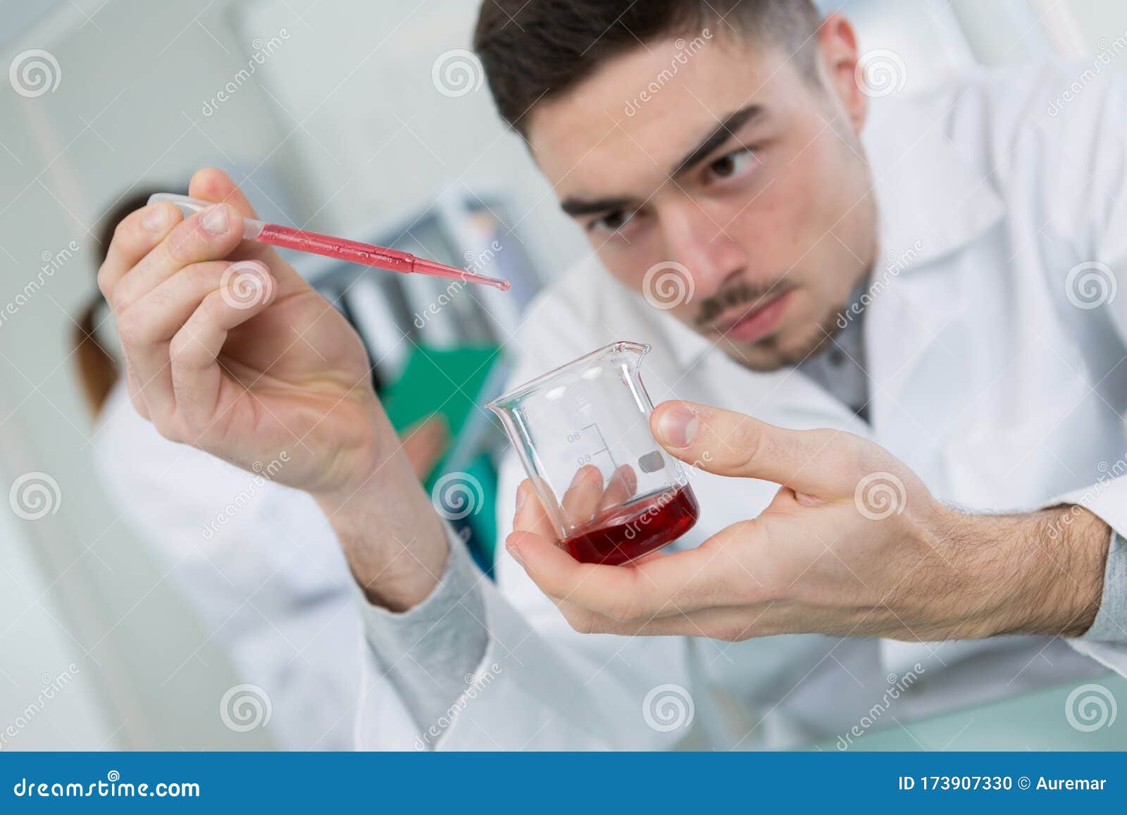 Young Doctor with Blood Sample Stock Photo - Image of sample, plasma ...