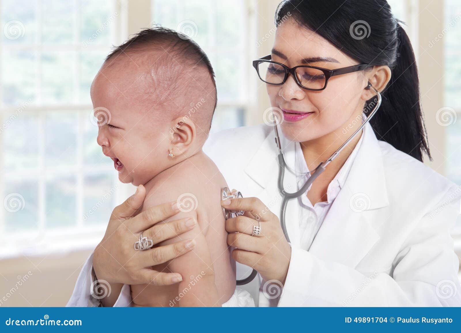 Young Doctor Checking Little Baby Stock Photo - Image of beautiful ...