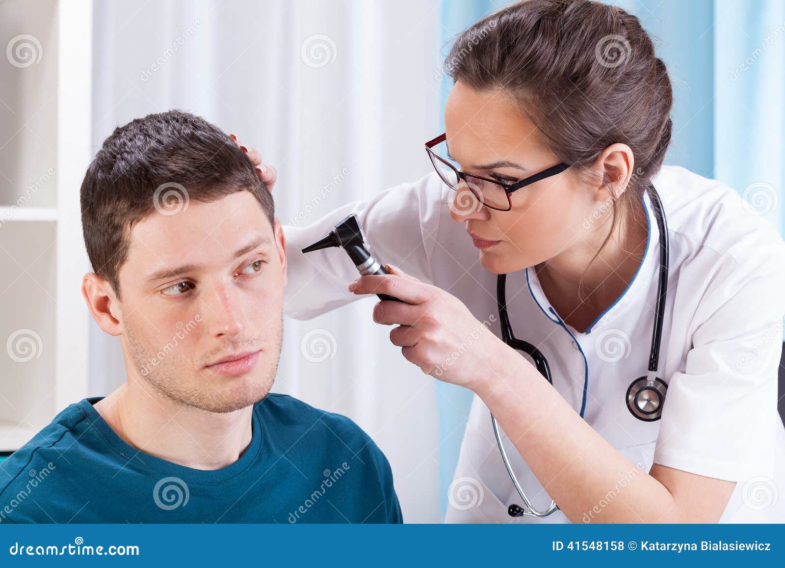 Young Doctor Examining Patient S Ears Stock Photo - Image of consulting ...