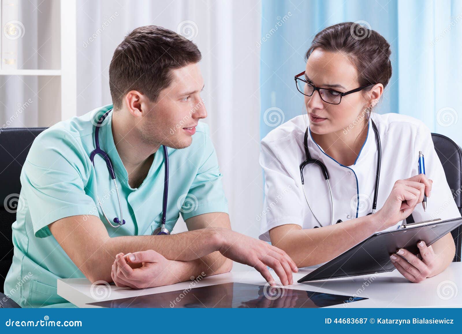 Young Doctor and Fellow Worker Stock Image - Image of practitioner ...