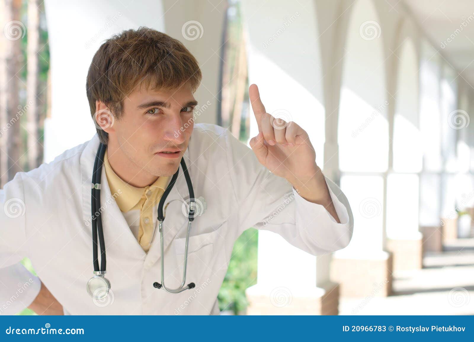 Young Doctor with a Finger Up Stock Image - Image of doctor ...