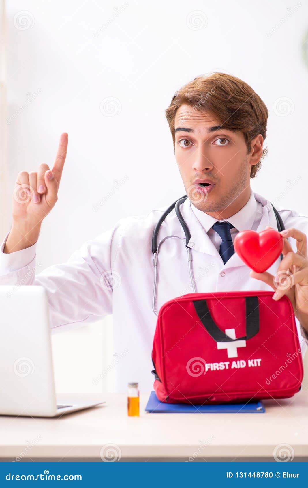 The Young Doctor with First Aid Kit in Hospital Stock Photo - Image of ...