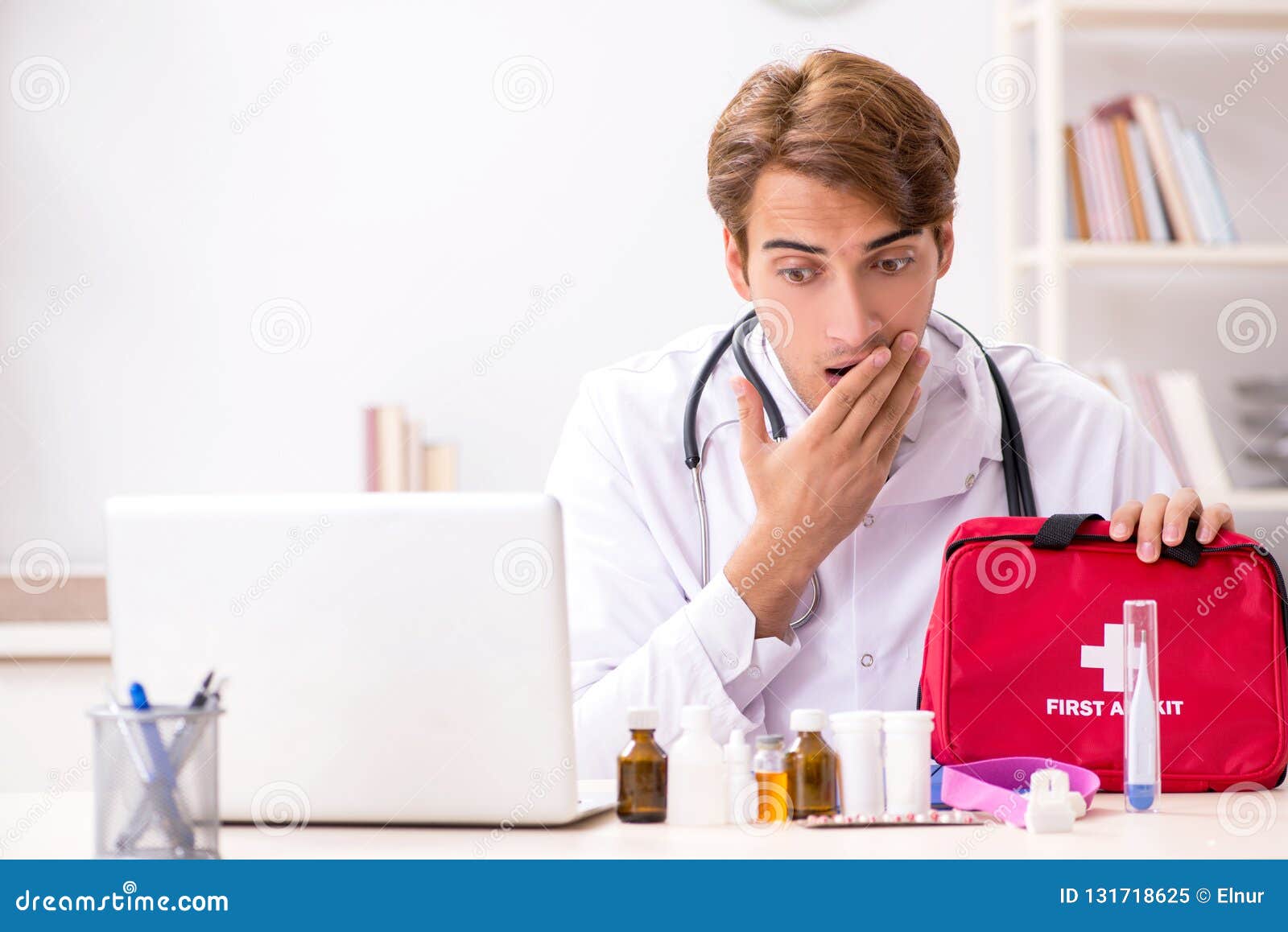 The Young Doctor with First Aid Kit in Hospital Stock Image - Image of ...