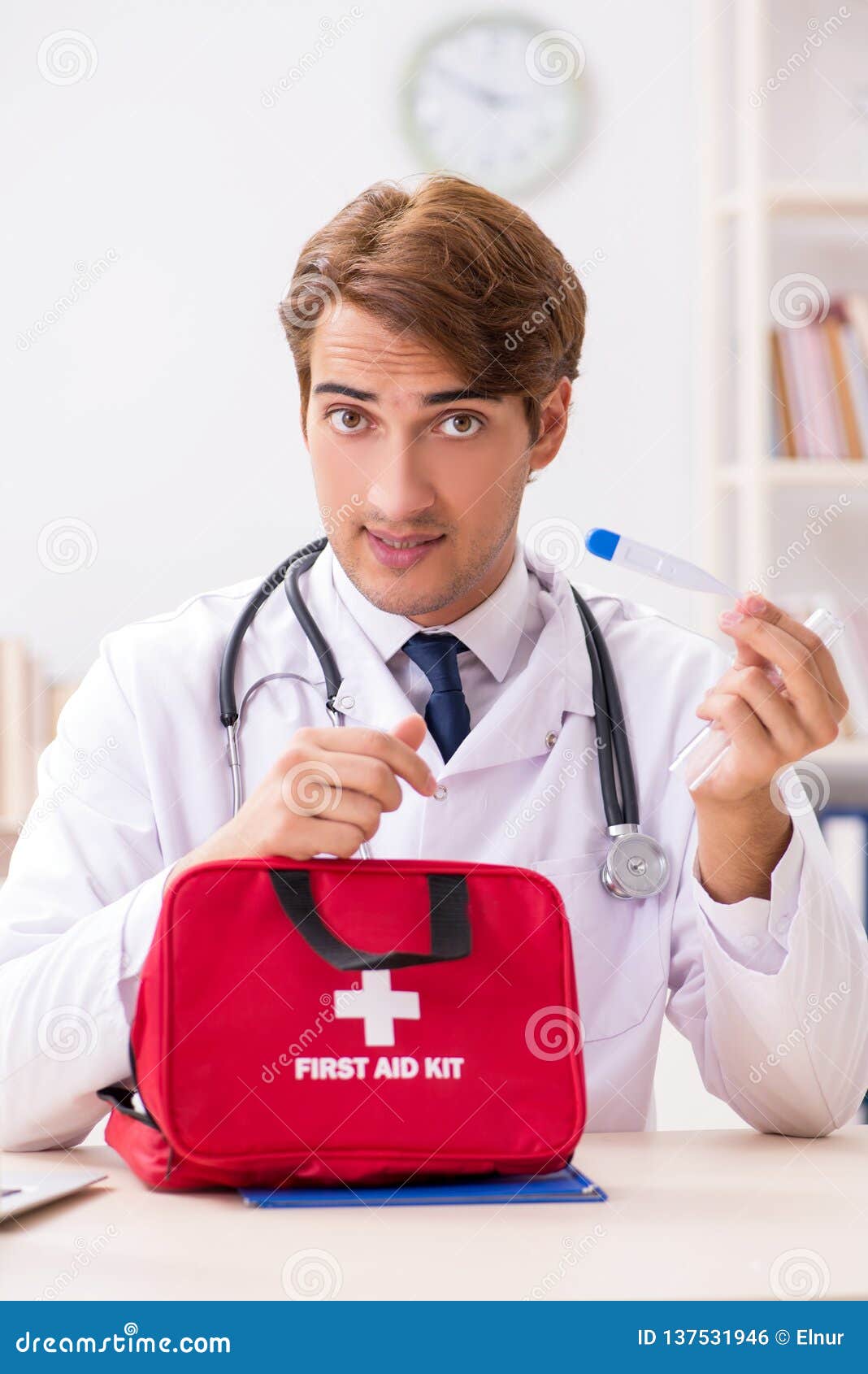 The Young Doctor with First Aid Kit in Hospital Stock Photo - Image of ...