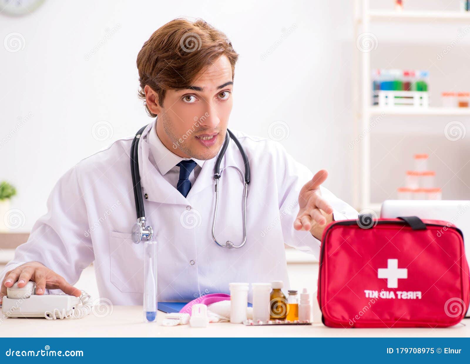 Young Doctor with First Aid Kit in Hospital Stock Image - Image of ...