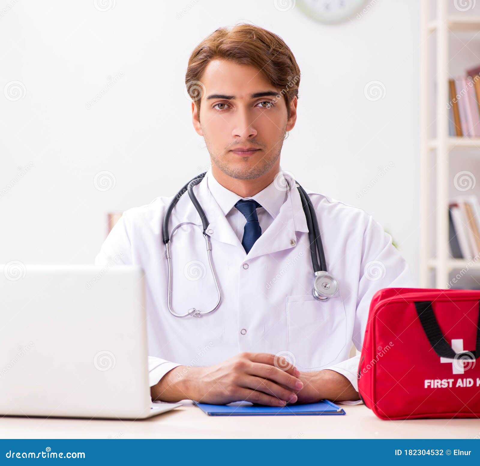 Young Doctor with First Aid Kit in Hospital Stock Photo - Image of ...