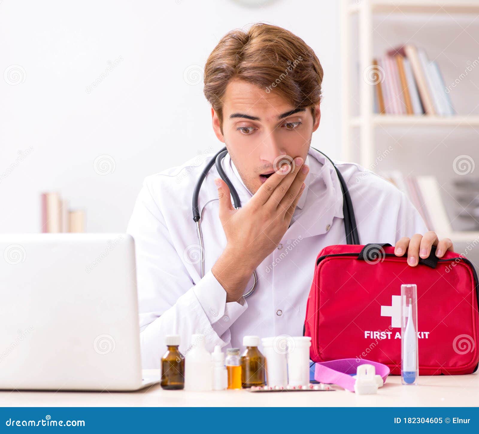 Young Doctor with First Aid Kit in Hospital Stock Image - Image of ...