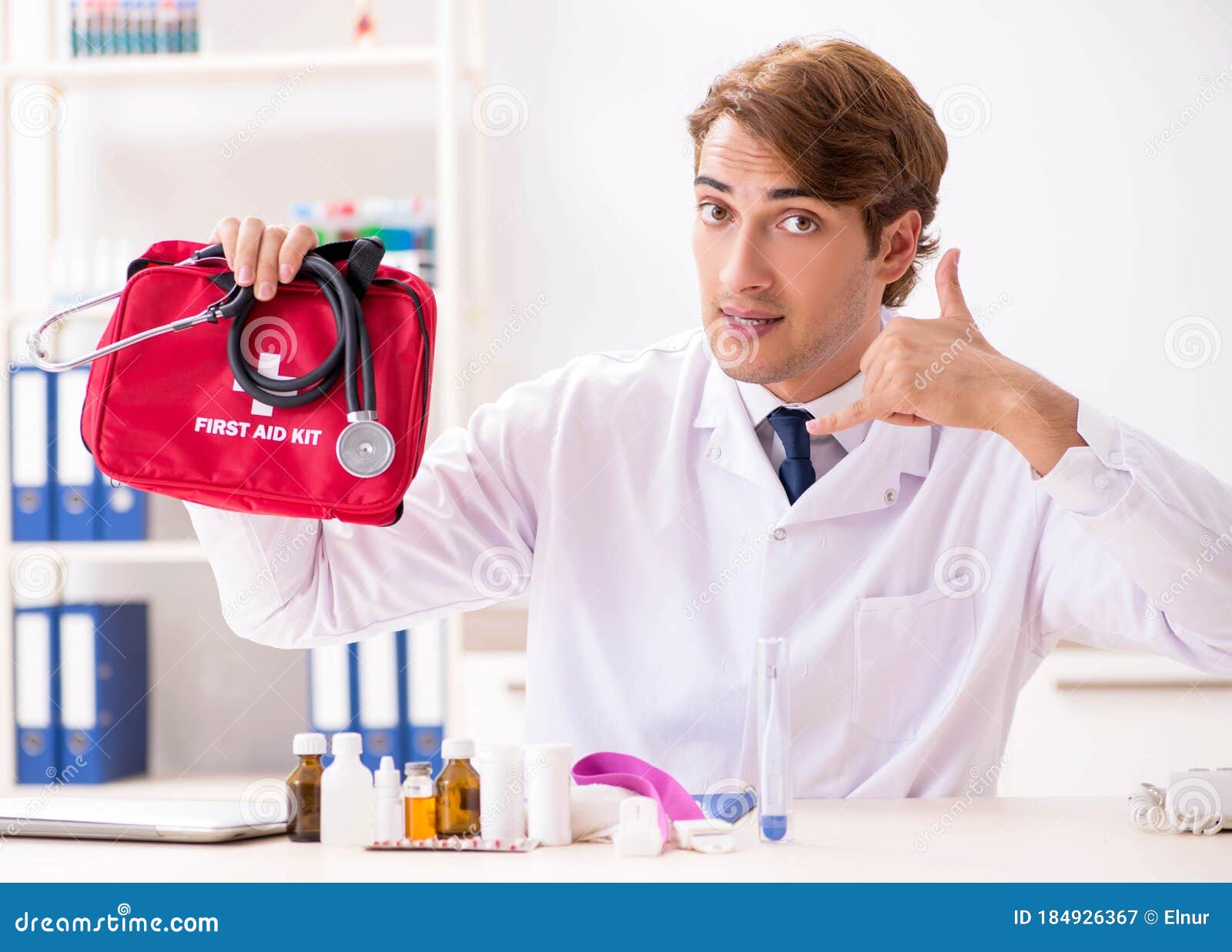 Young Doctor with First Aid Kit in Hospital Stock Image - Image of ...