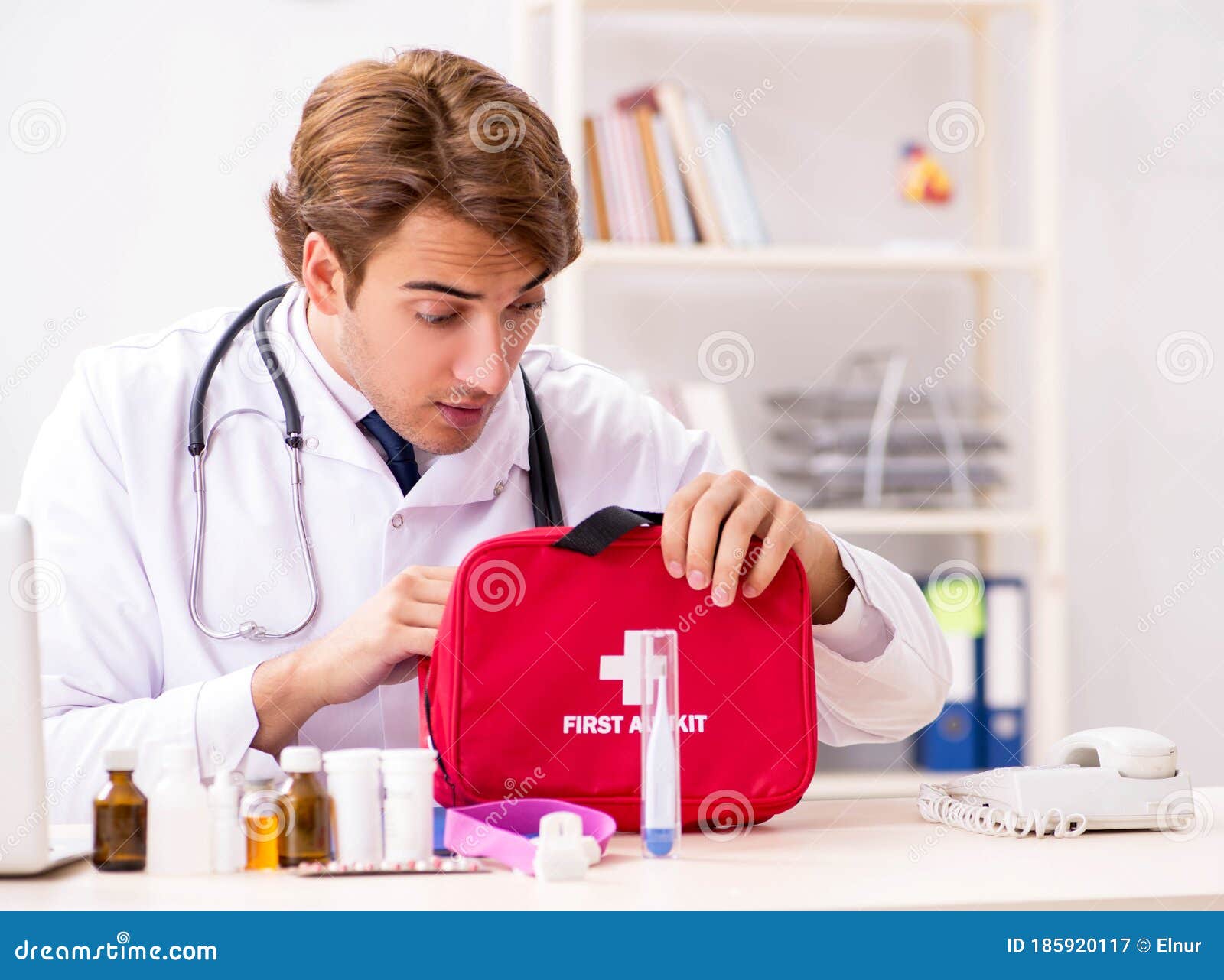 Young Doctor with First Aid Kit in Hospital Stock Image - Image of ...