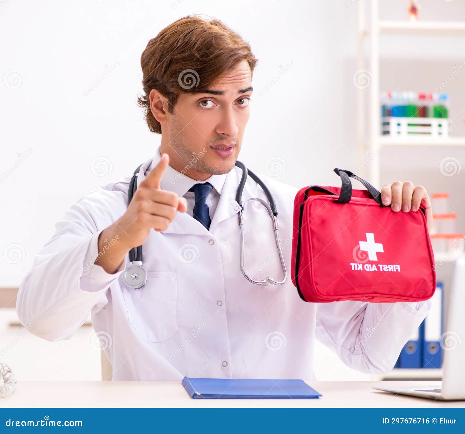Young Doctor with First Aid Kit in Hospital Stock Photo - Image of ...