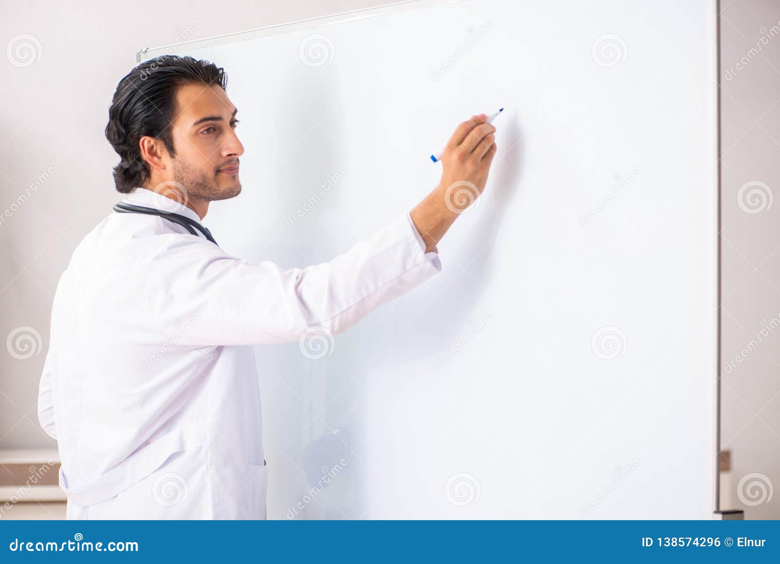 The Young Doctor in Front of Whiteboard Stock Photo - Image of ...