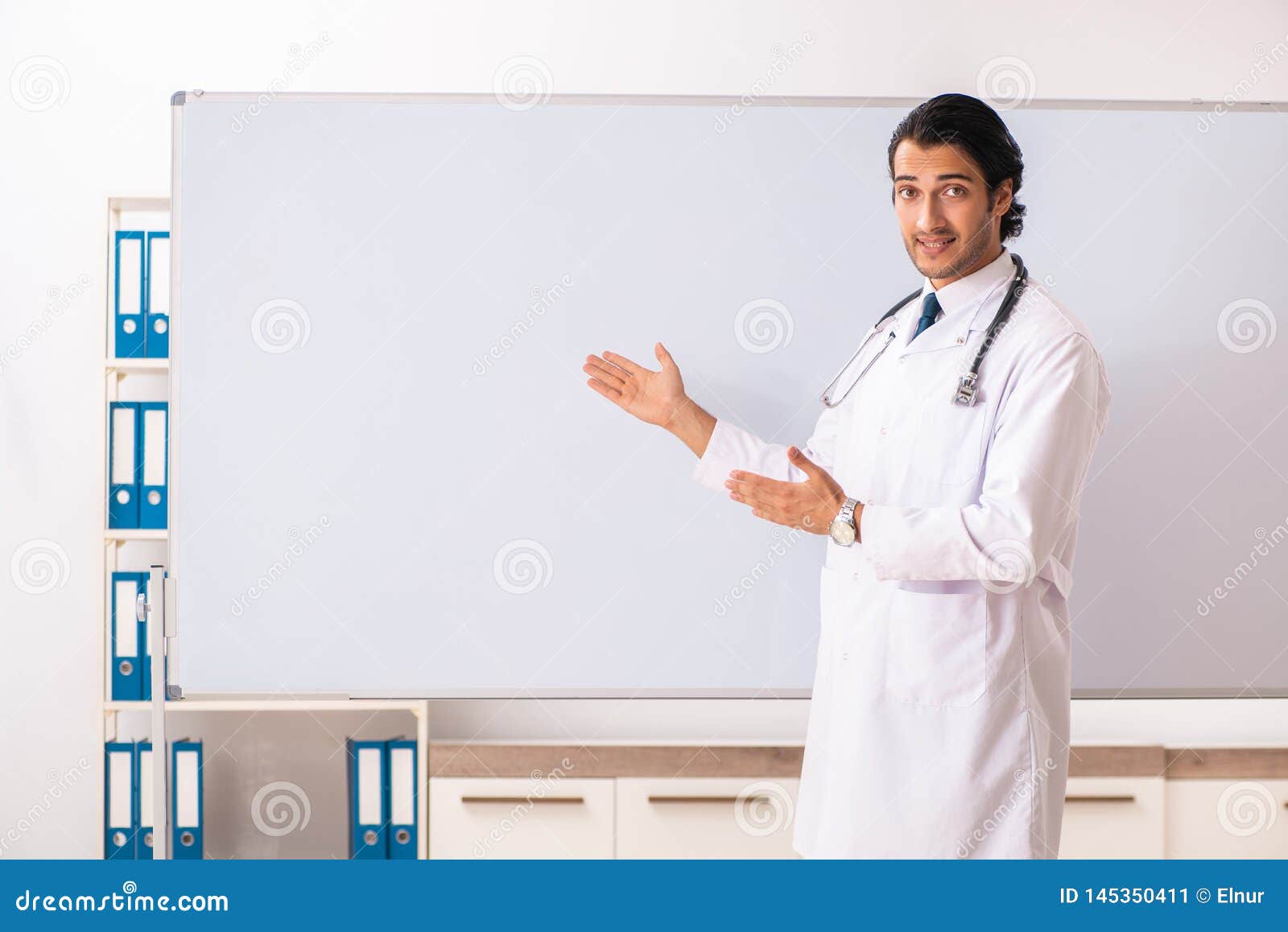 The Young Doctor in Front of Whiteboard Stock Image - Image of medic ...
