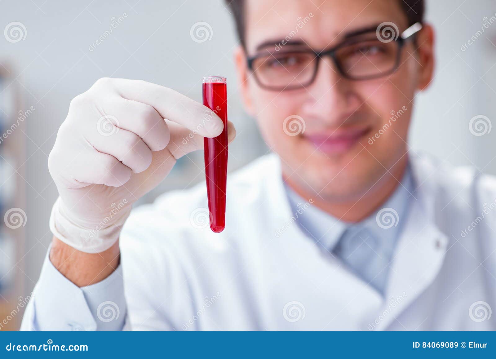The Young Doctor in the Lab with Red Tube Stock Image - Image of ...
