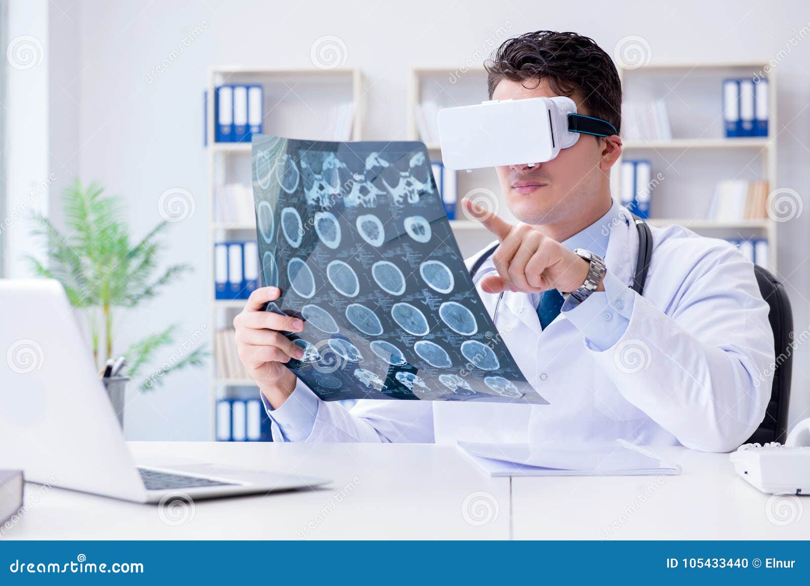 The Young Doctor Looking at Mri Scan through Vr Glasses Stock Photo ...