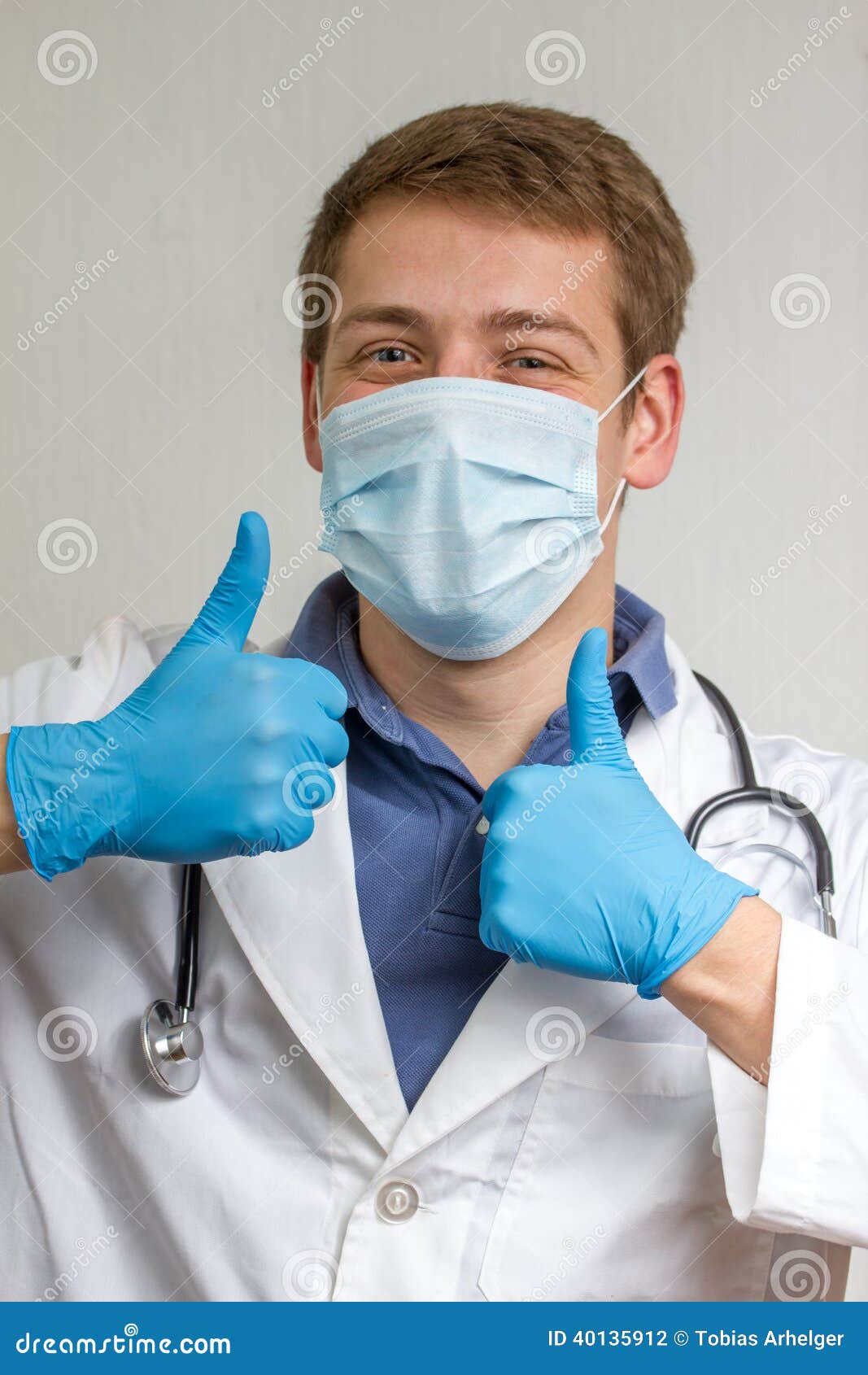 Young Doctor Making an Thumbs Up Sign Stock Photo - Image of handsome ...