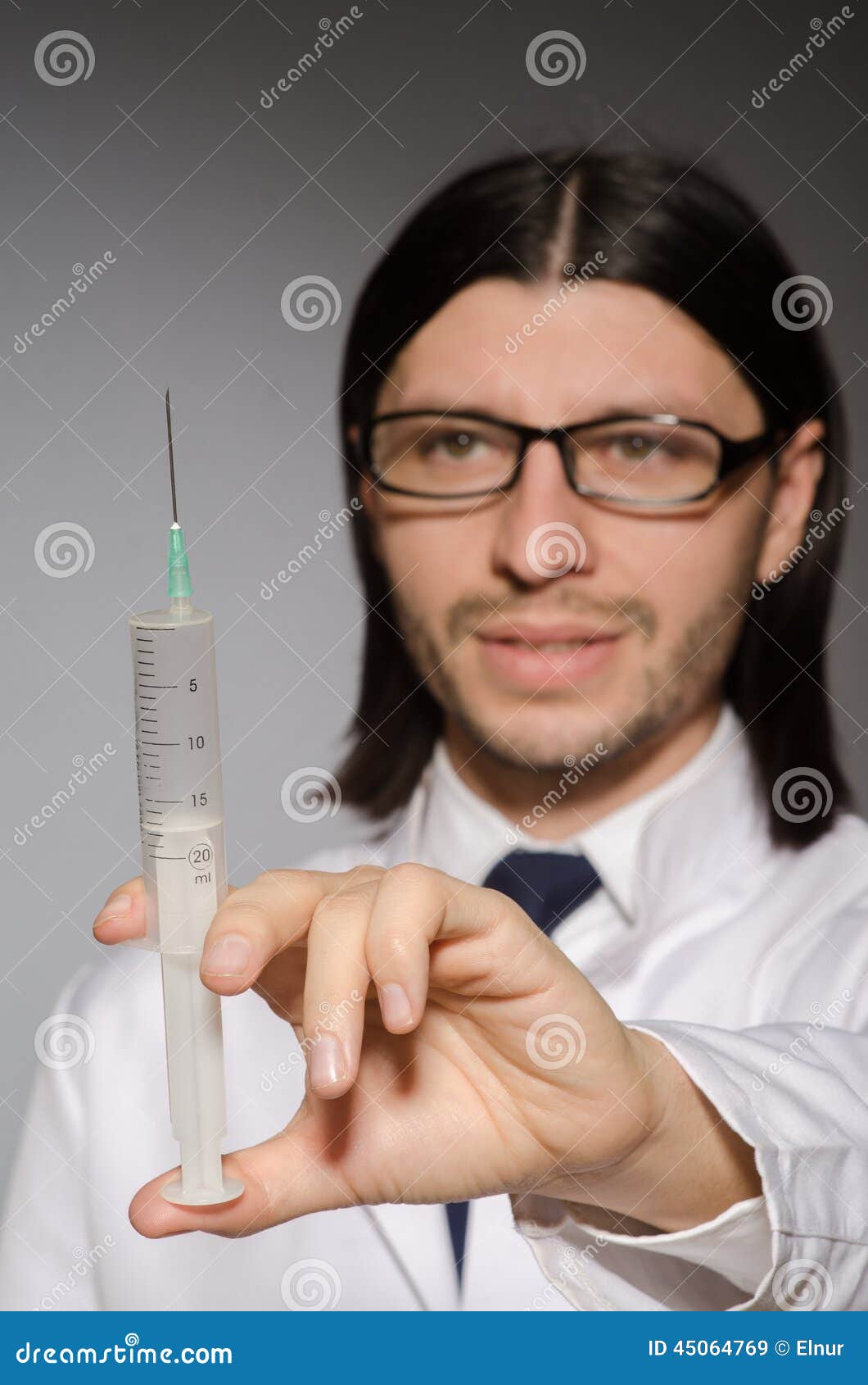 Young Doctor Man with Syringe Against Stock Image - Image of eyeglasses ...