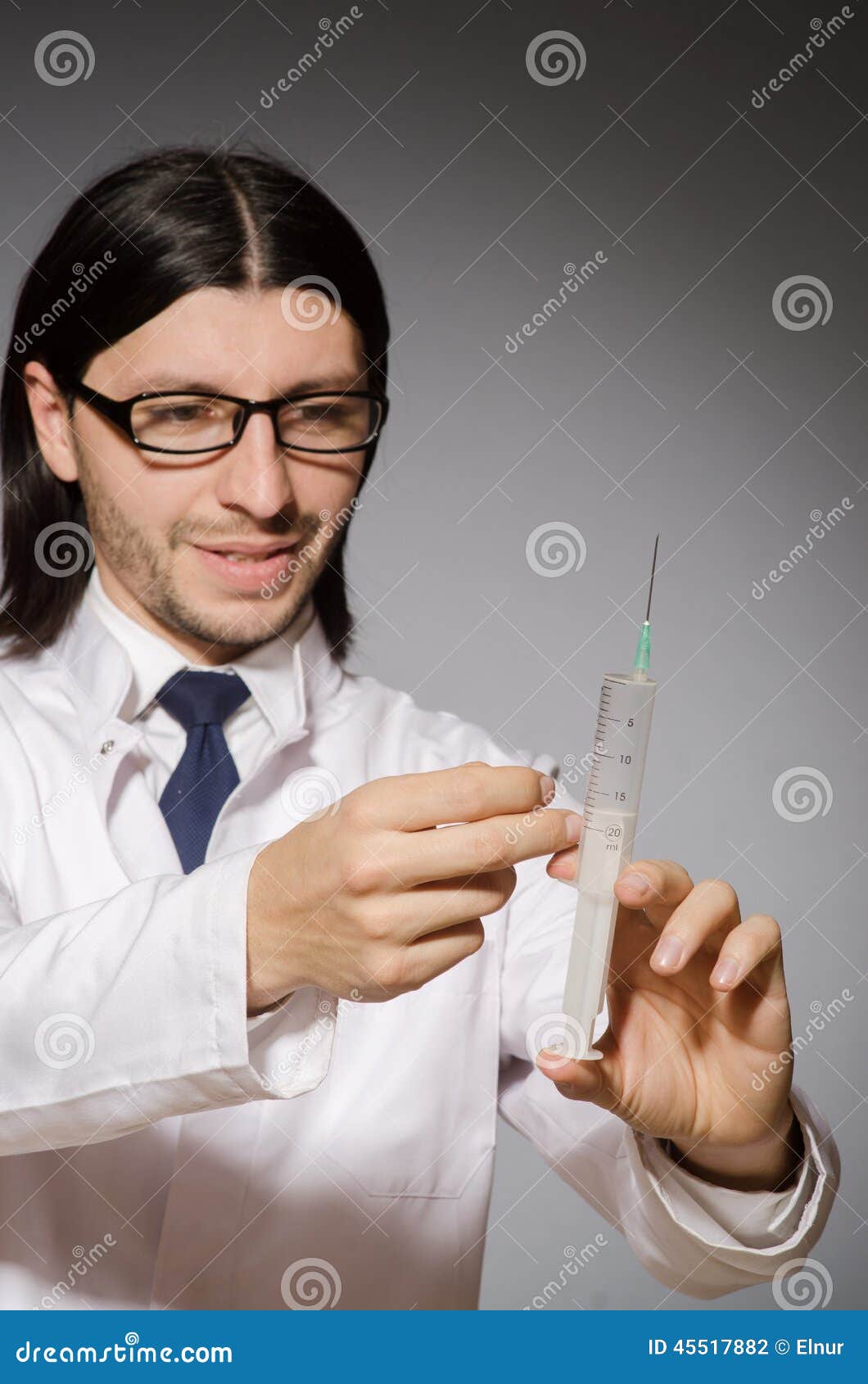 Young Doctor Man with Syringe Against Stock Photo - Image of coat ...