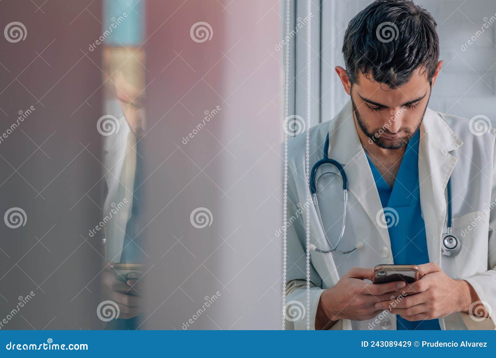 Doctor with mobile phone stock image. Image of insurance - 243089429