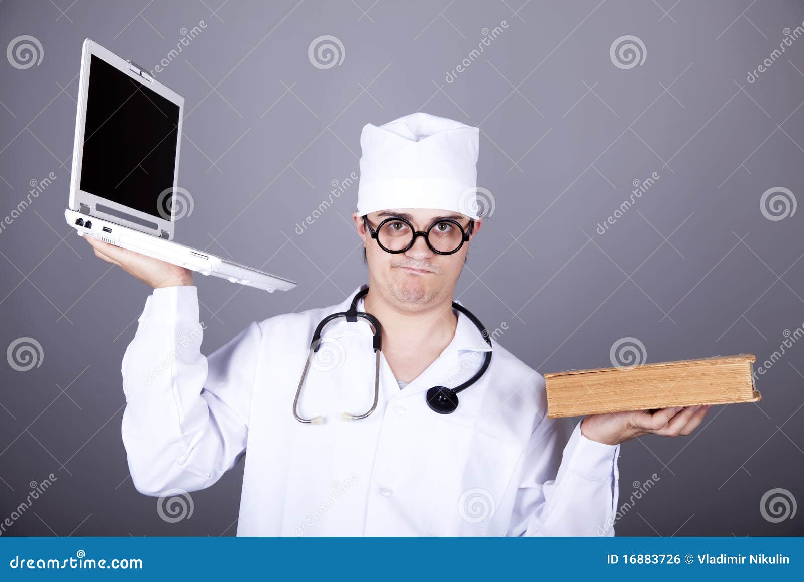 Young Doctor with Notebook and Book. Stock Photo - Image of office ...