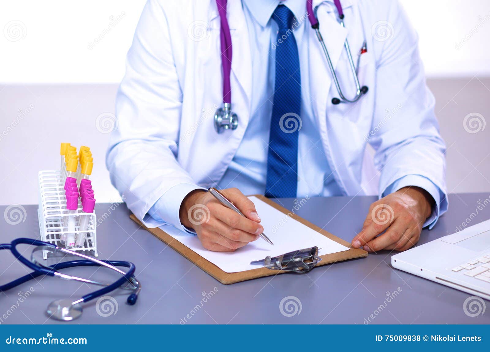 A Young Doctor in the Office Makes an Entry Stock Photo - Image of care ...