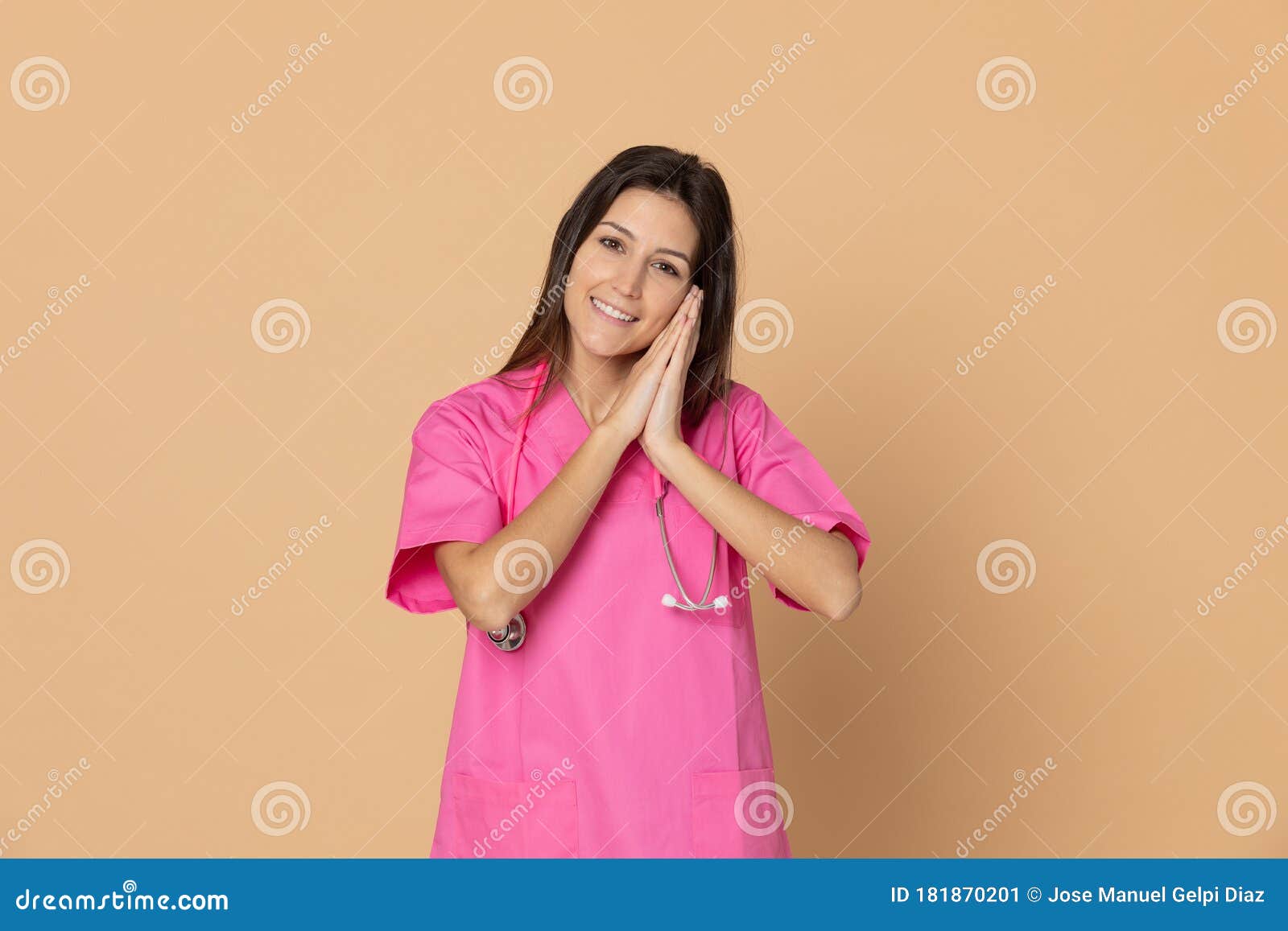 Young Doctor with a Pink Uniform Stock Image - Image of stethoscope ...