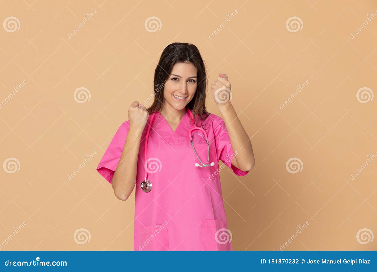 Young Doctor with a Pink Uniform Stock Photo - Image of adult, victory ...