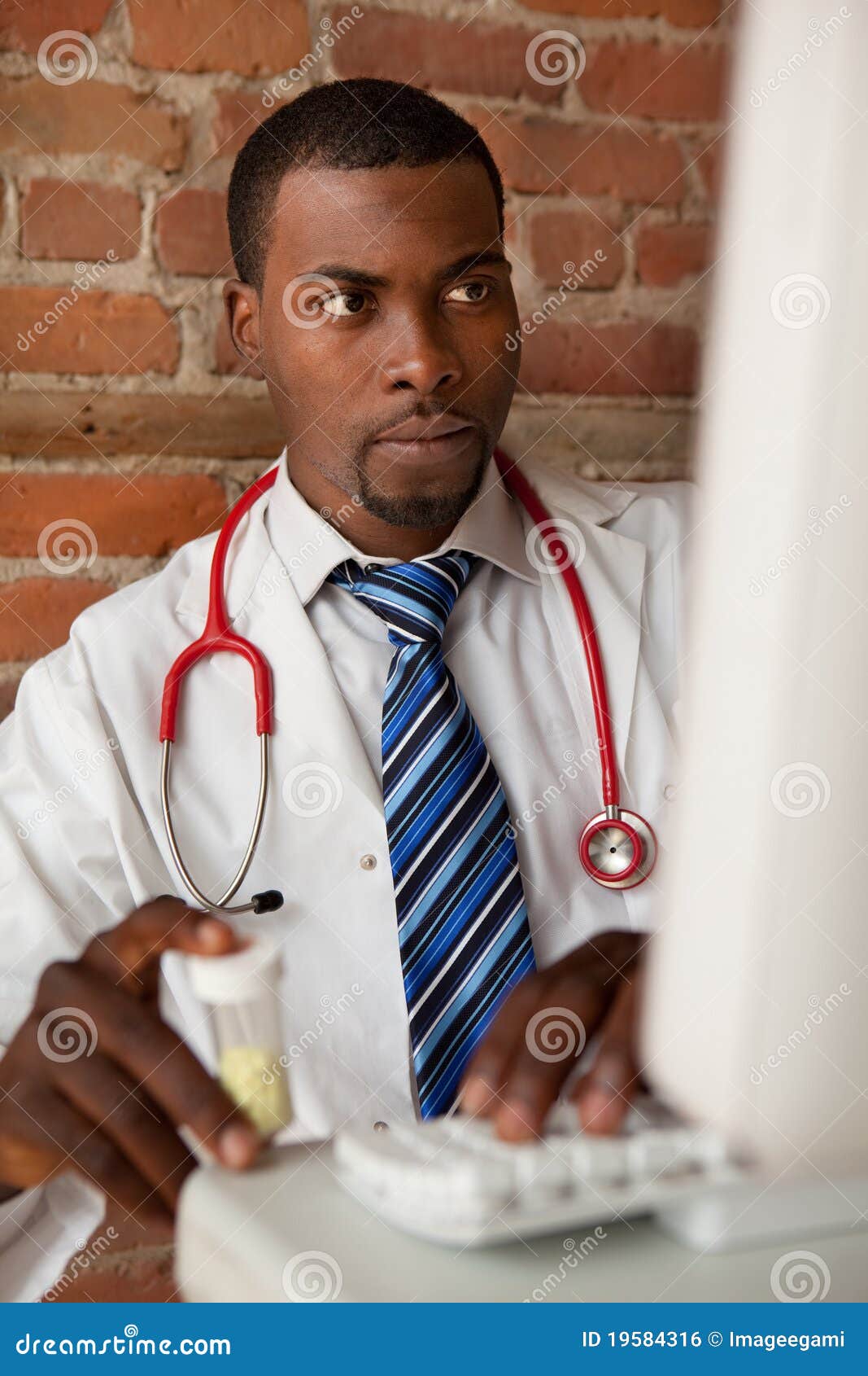 Young Doctor Prescribing Medication Stock Photo - Image of medicine ...