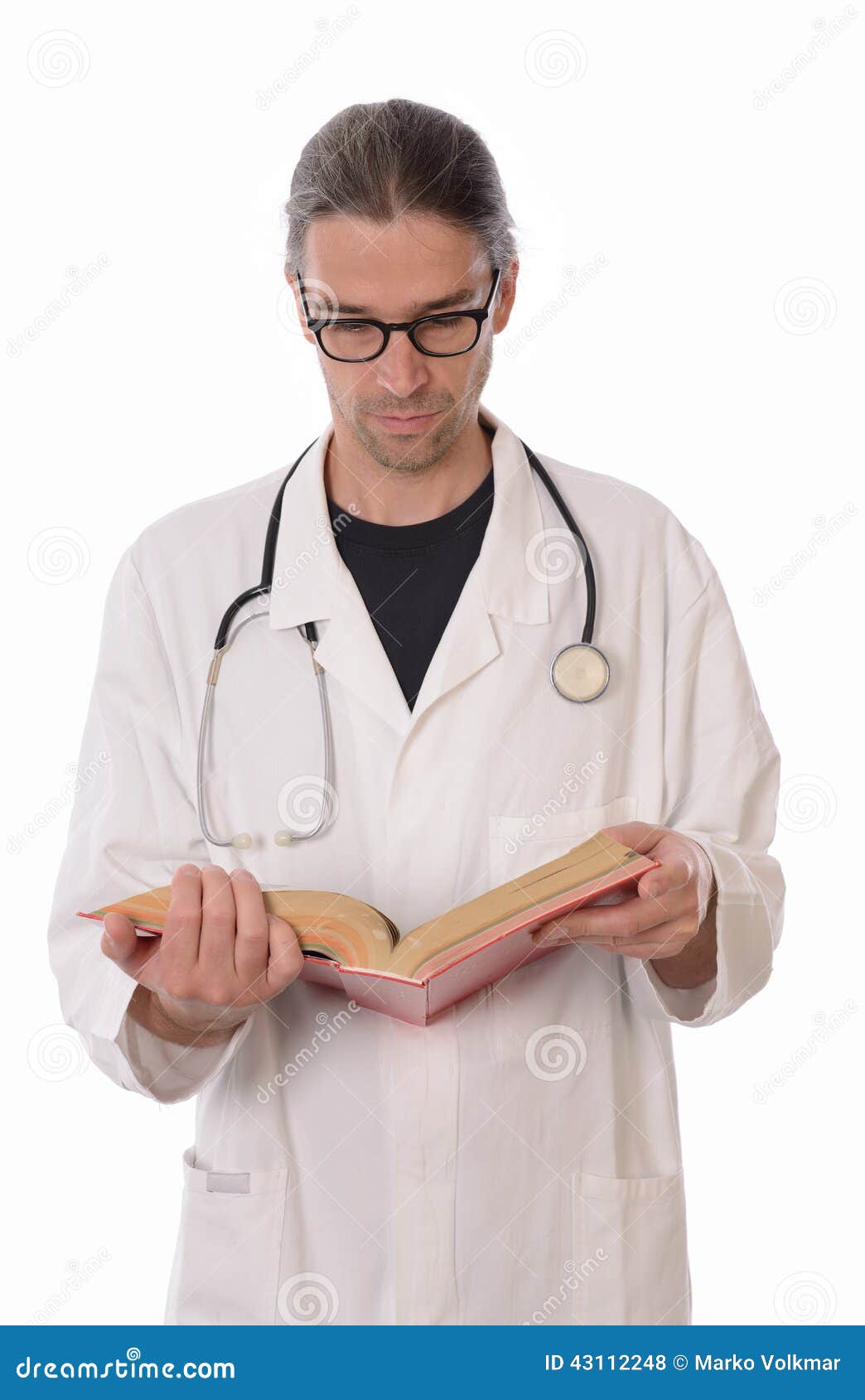 Young doctor is reading stock photo. Image of coat, examination - 43112248