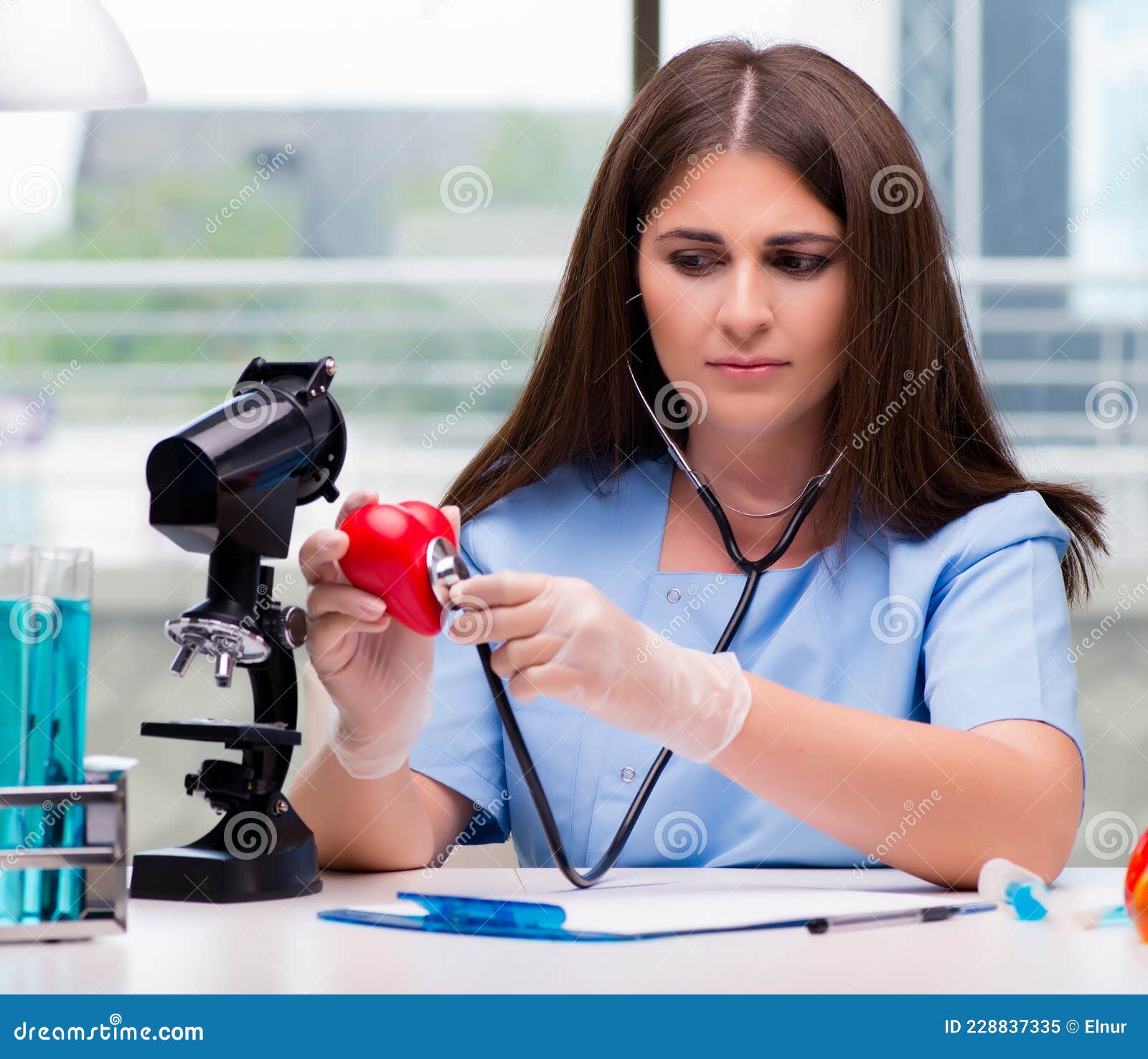 Young Doctor with Red Heart in Lab Stock Image - Image of medical ...